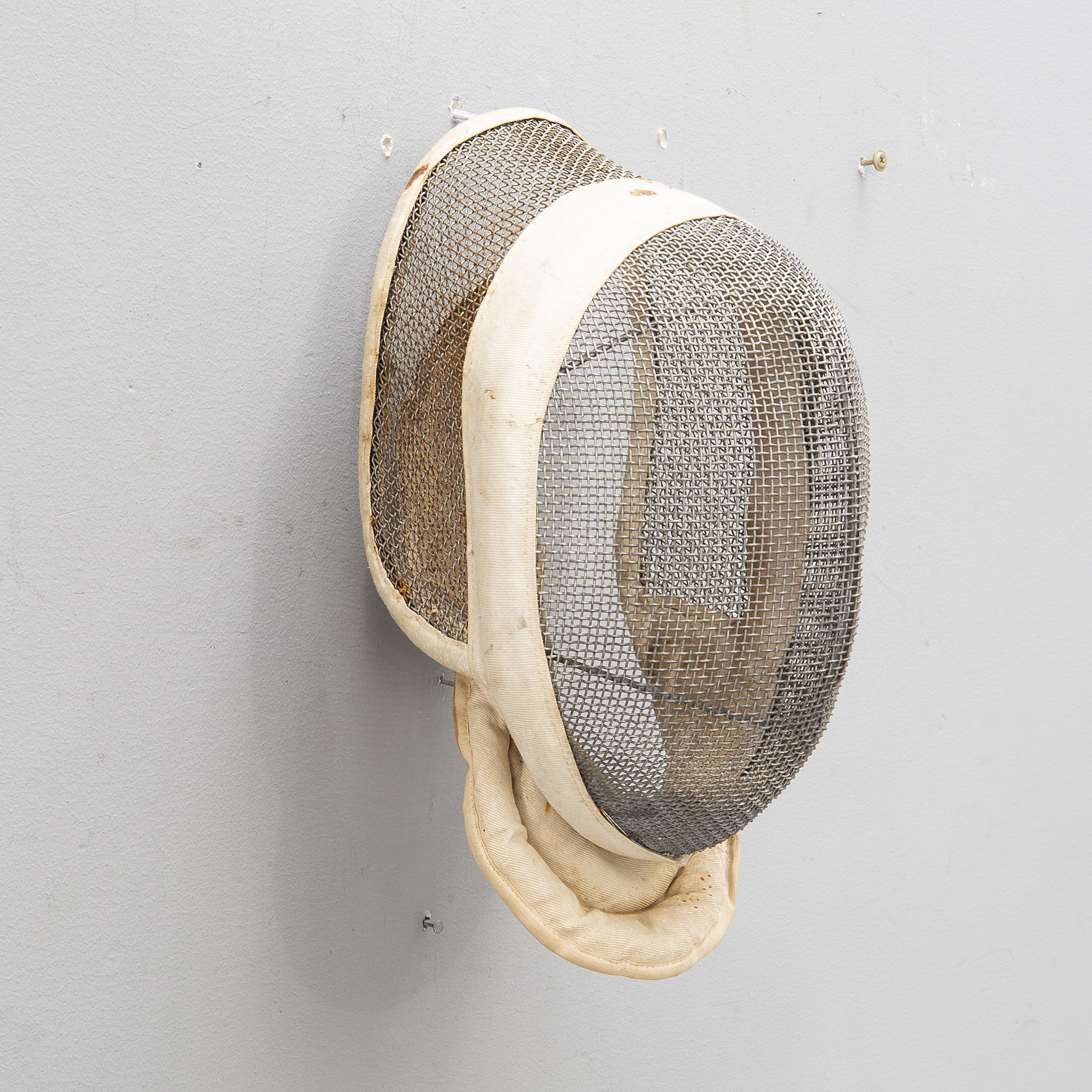 A French set of sword, mask and clothing for fencing, mid/second part ...