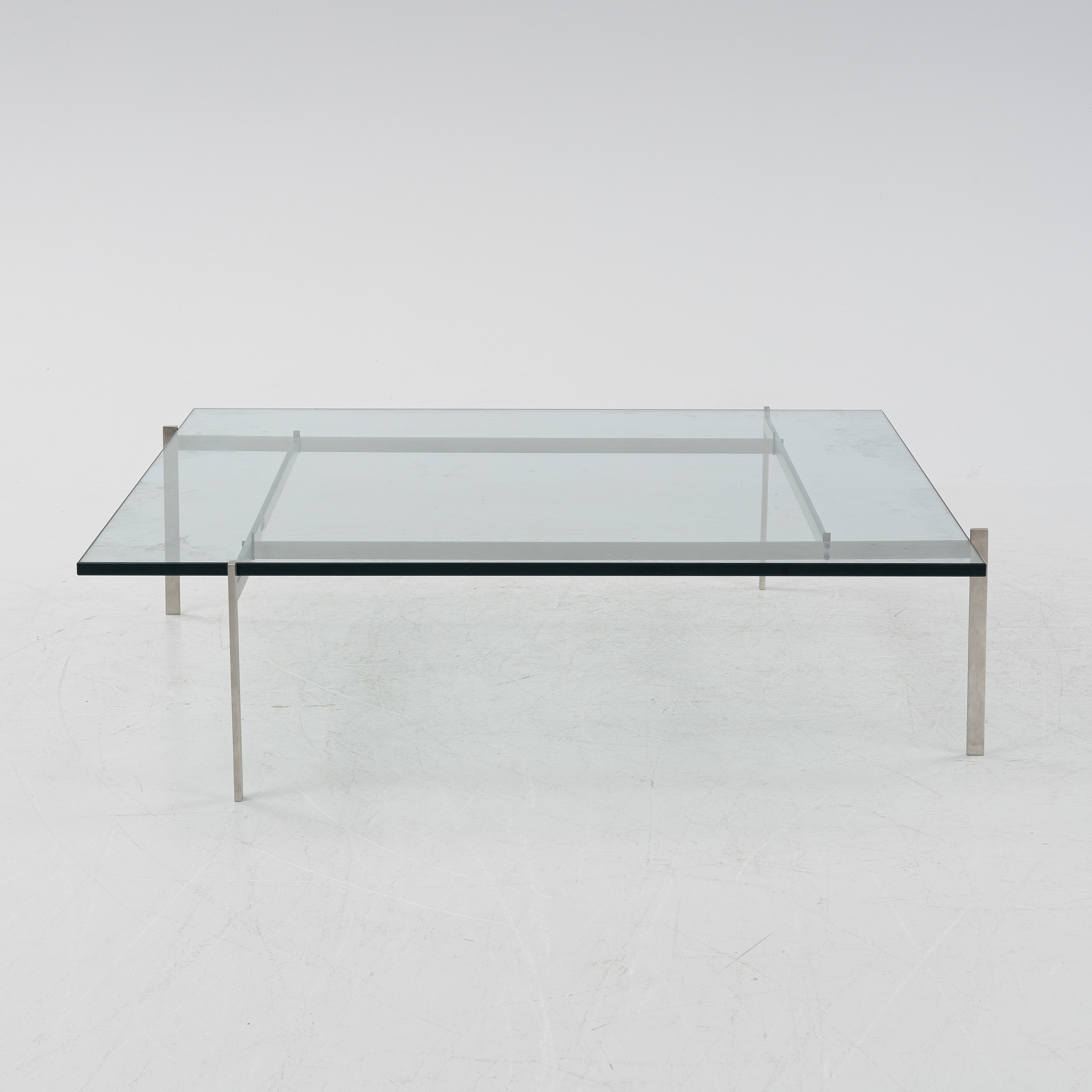 Poul Kjaerholm, a 'PK61A' glass coffee table, Fritz Hansen, Denmark ...