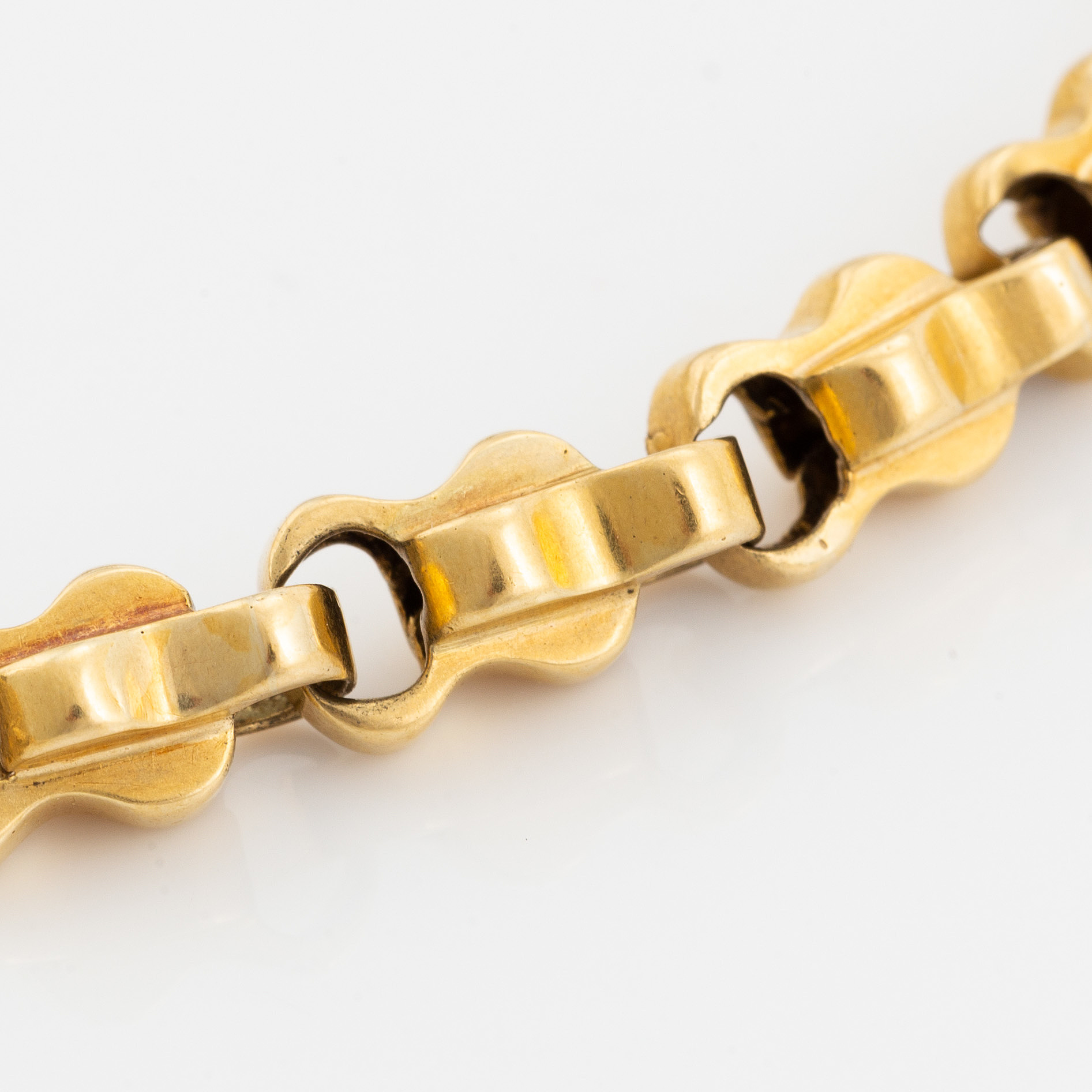 Kedja med berlocker i form av Frimurarsymboler, 18K guld. - Bukowskis