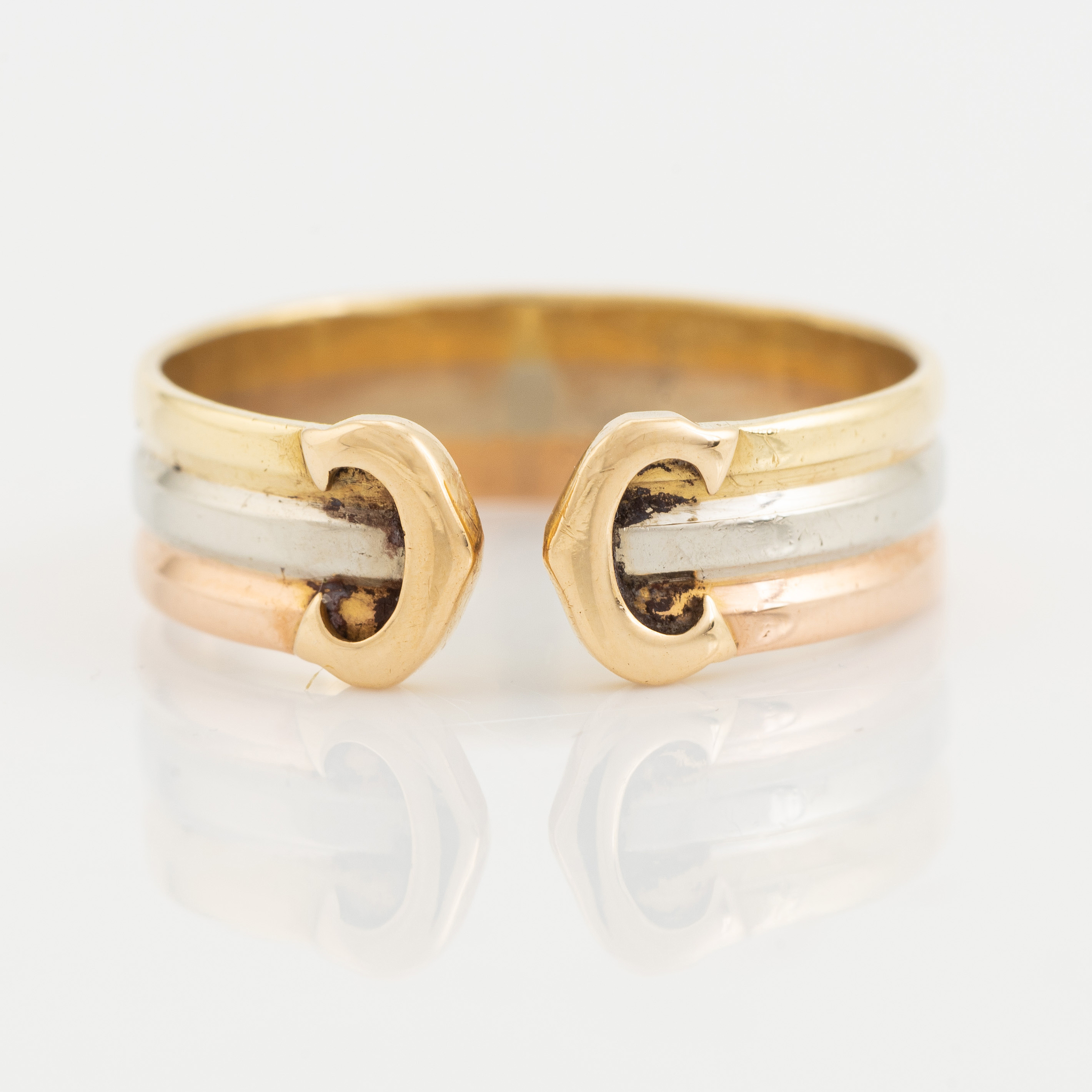 Cartier, 18K three coloured gold ring. - Bukowskis