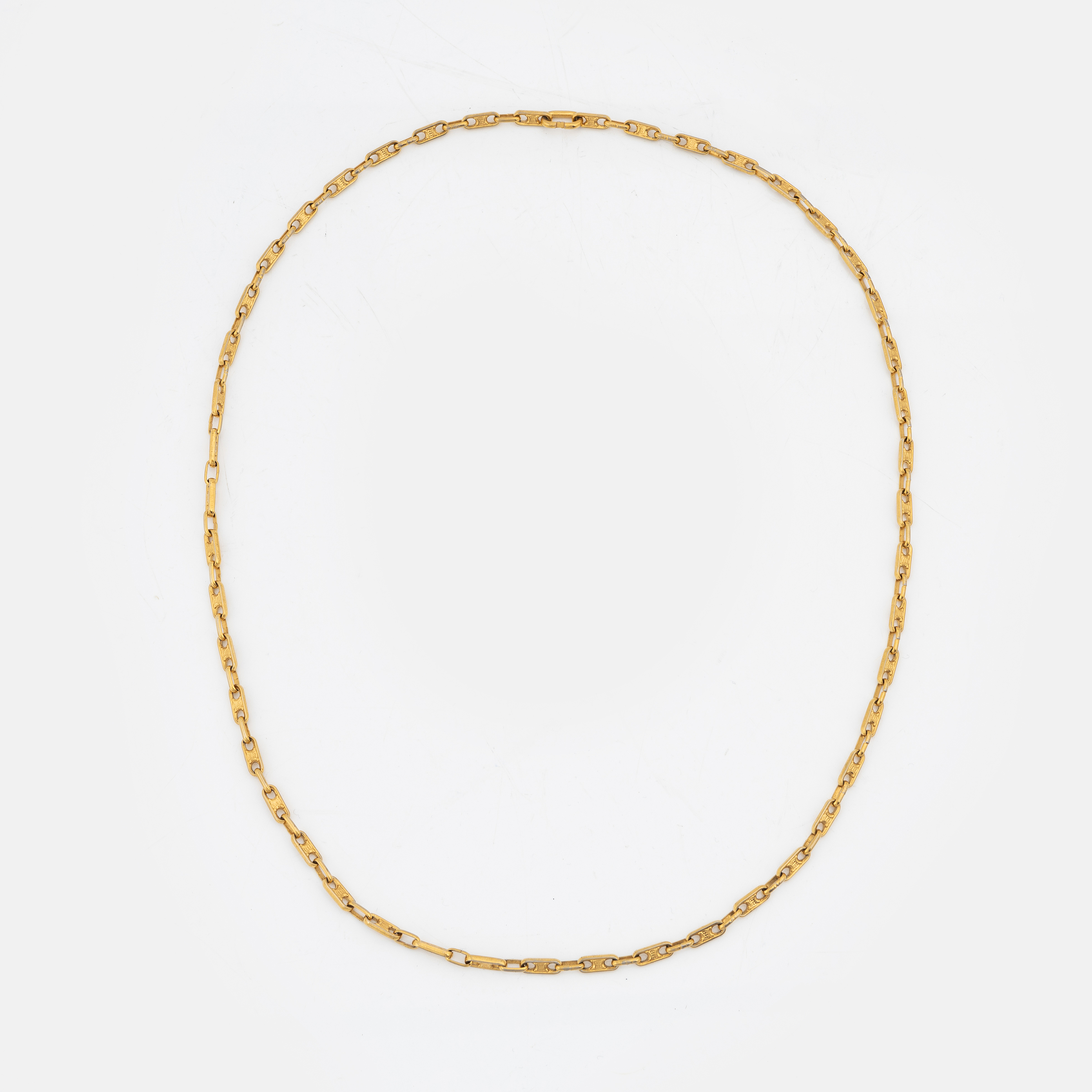 Céline, a gold tone chain. - Bukowskis