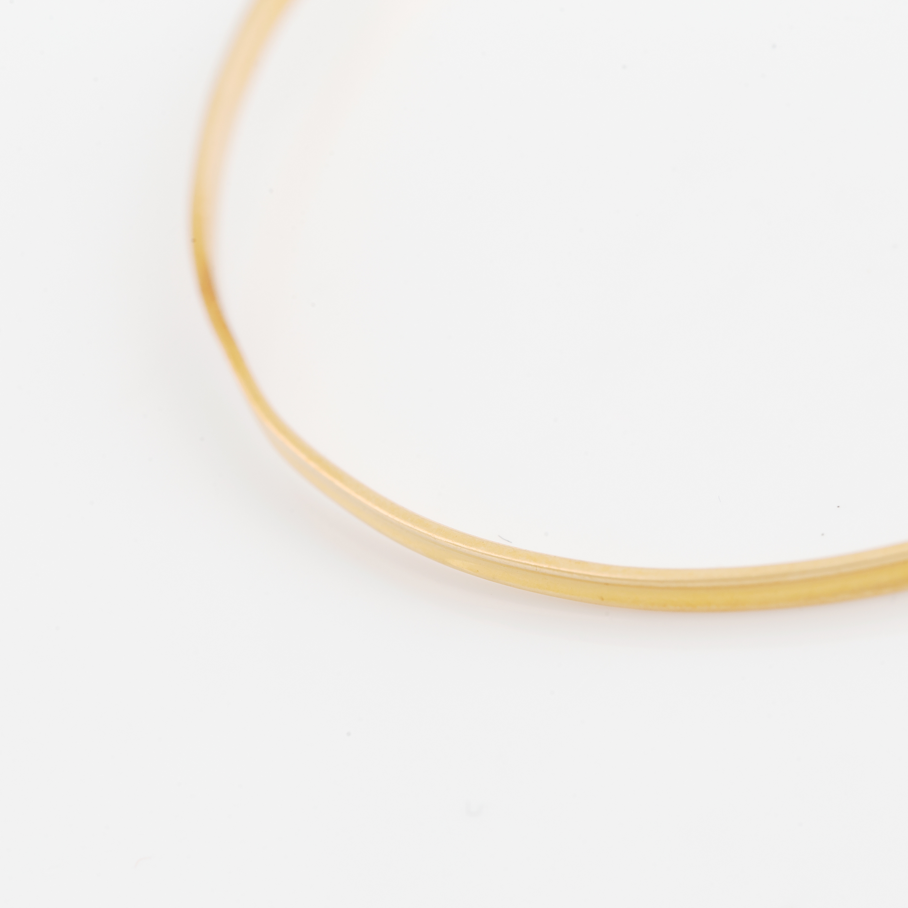 18K gold bangle. - Bukowskis