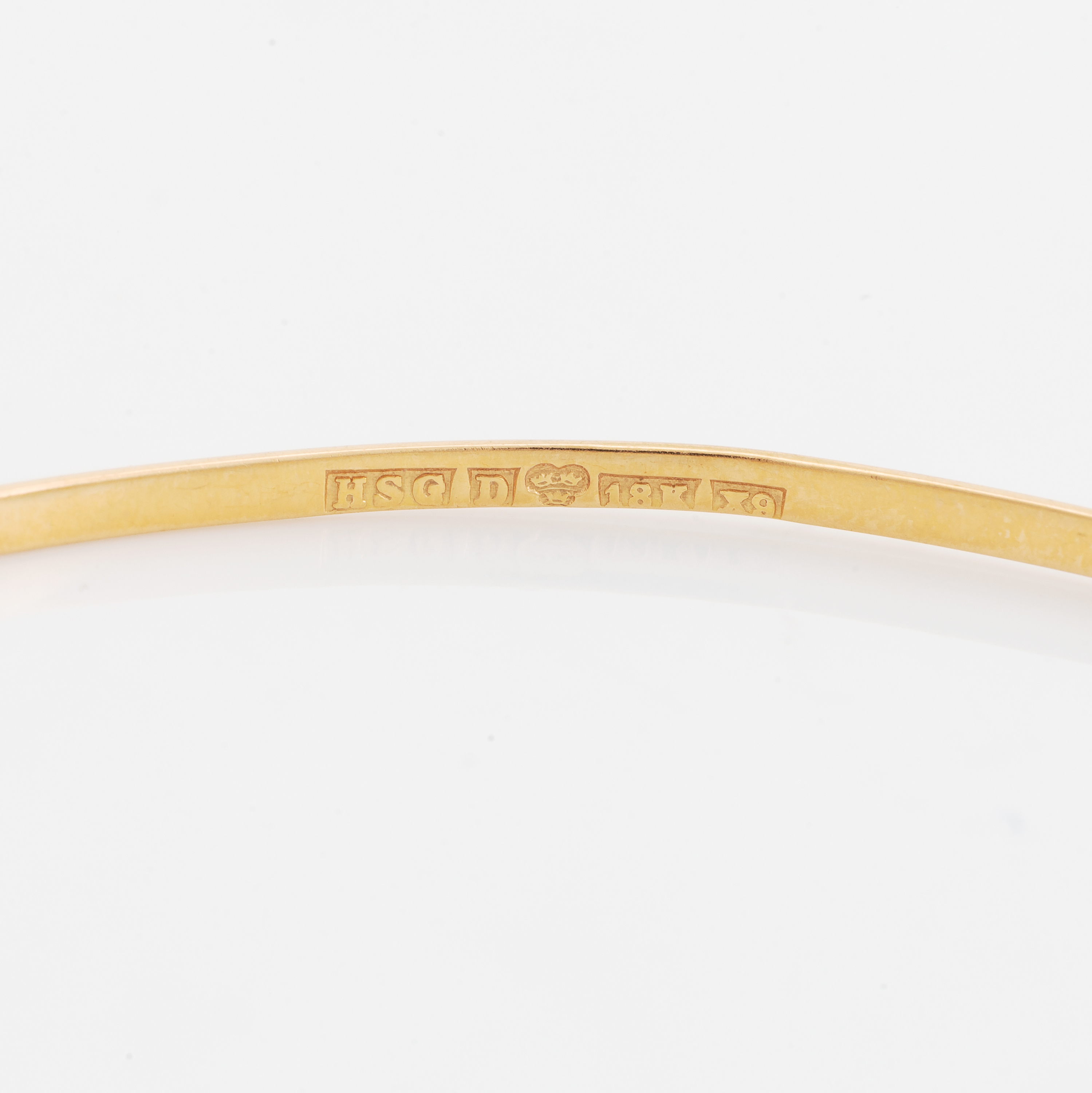 18K gold bangle. - Bukowskis