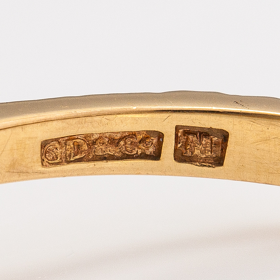 Sormus, 18K kultaa ja ametisti. Gustaf Dahlgren & Co, Malmö 1967. - Bukowskis