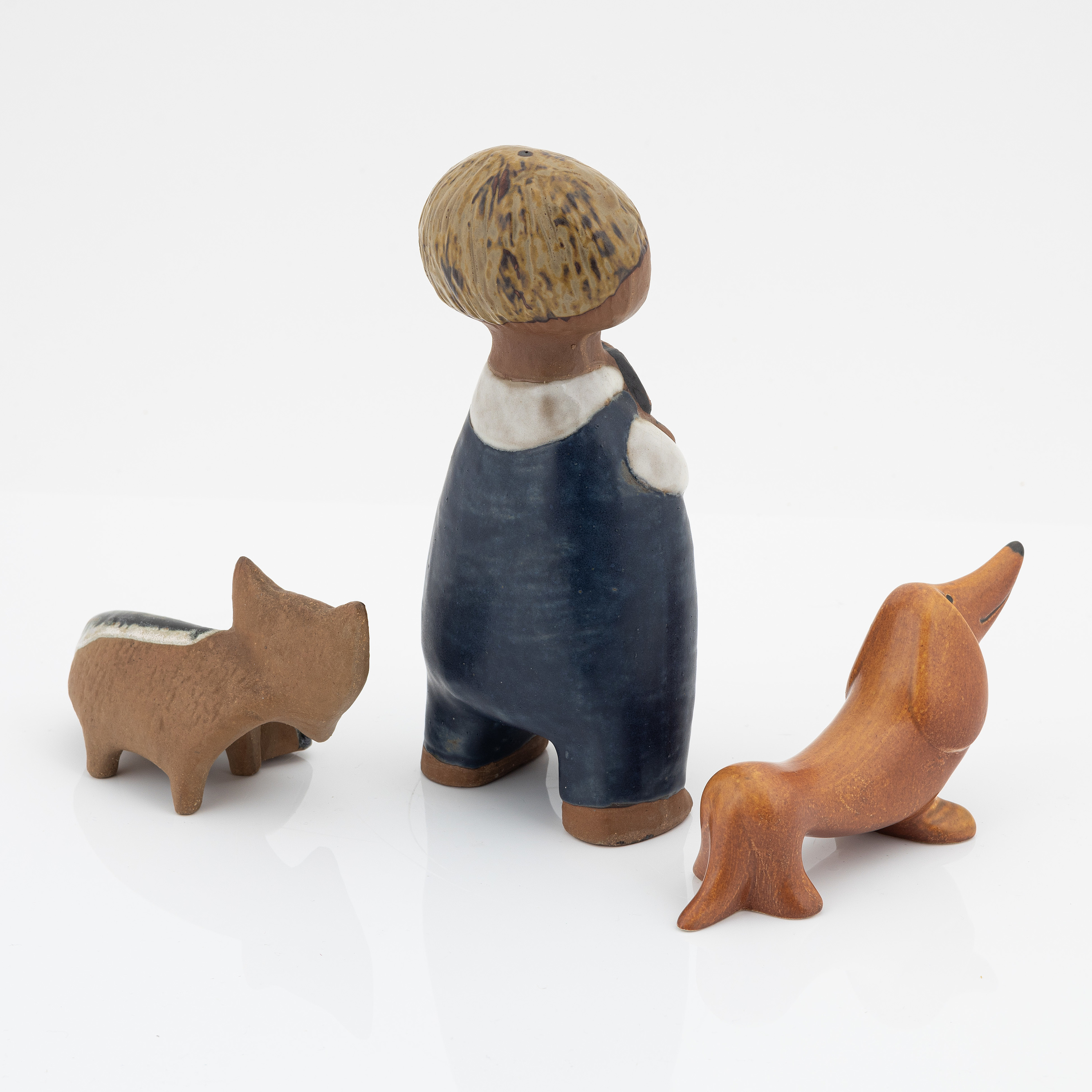 Lisa Larson, three stoneware figurines, Gustavsberg, Sweden. - Bukowskis