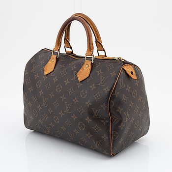 Louis Vuitton, a monogram canvas 'Speedy 30' handbag, 2001. - Bukowskis