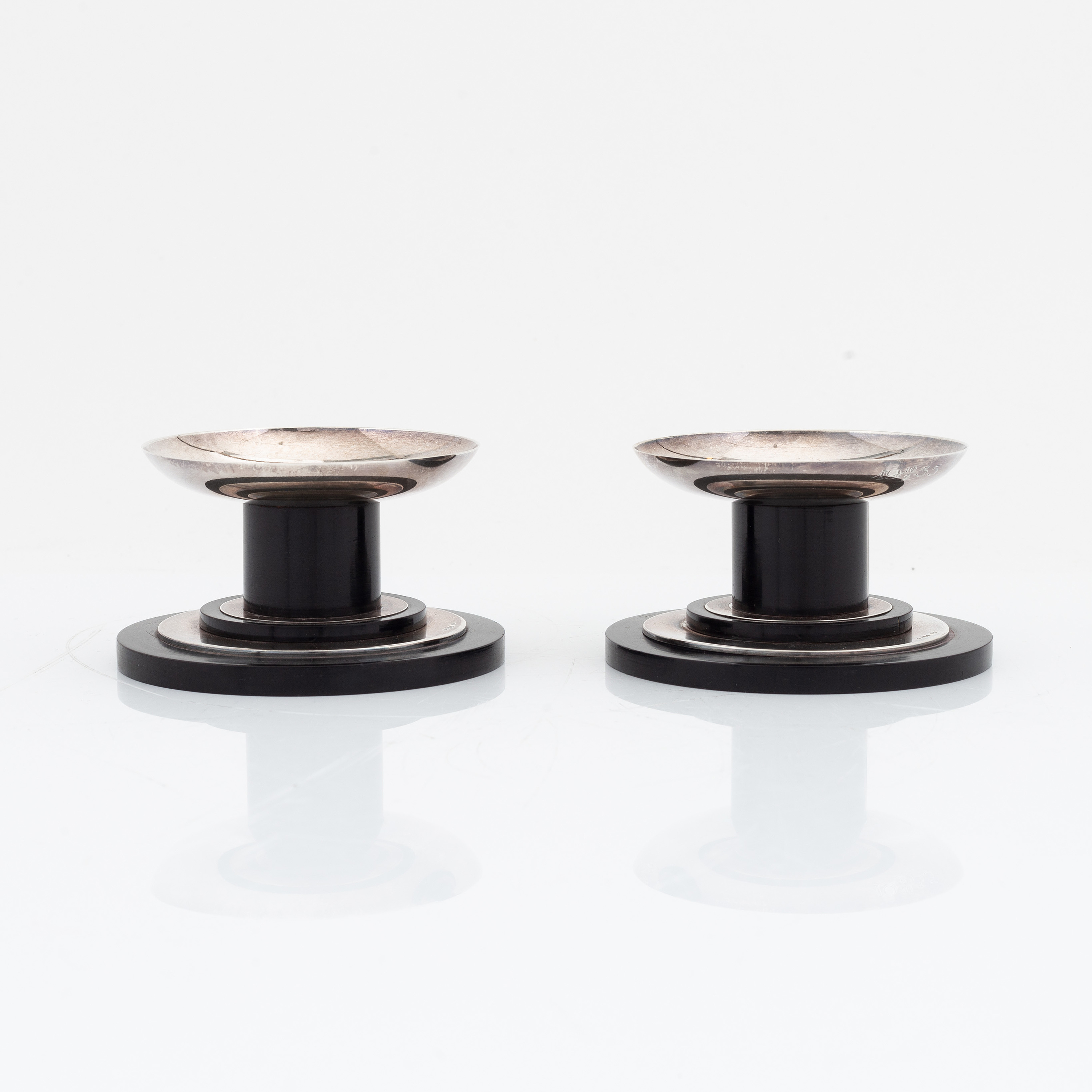 A pair of silver and bakelite candlesticks, GAB, Stockholm 1934 ...