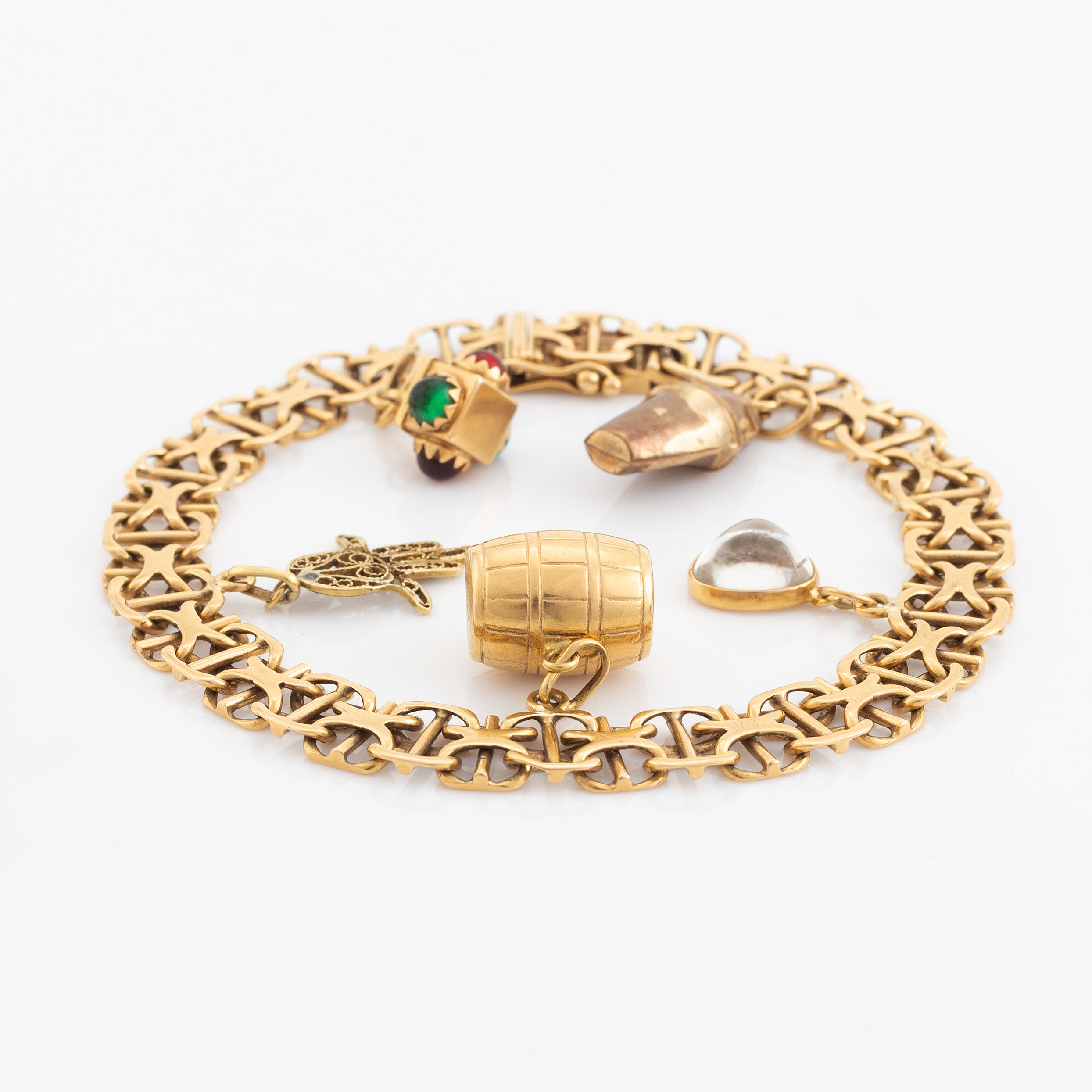 Armband, x-länk, 18K guld, med berlocker. - Bukowskis