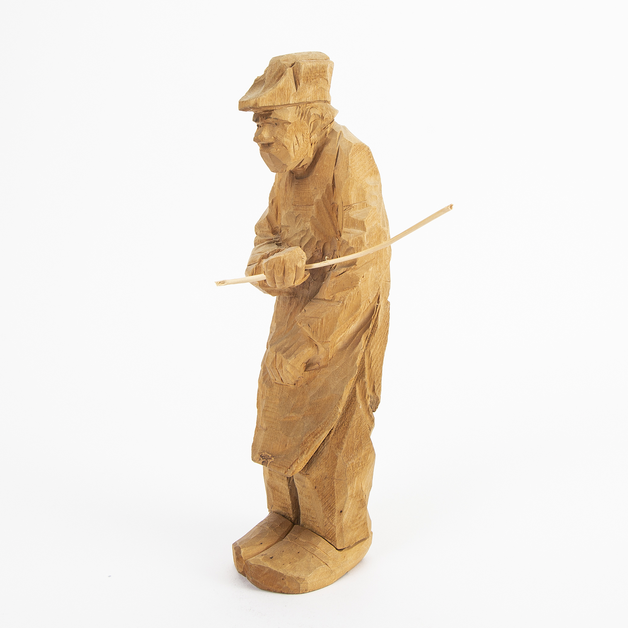 A carved wood sculpture by Axel Petersson Döderhultarn, stamped ...