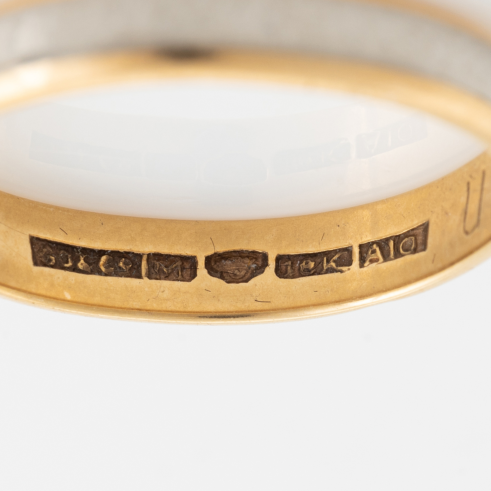 18K and 20K gold. - Bukowskis