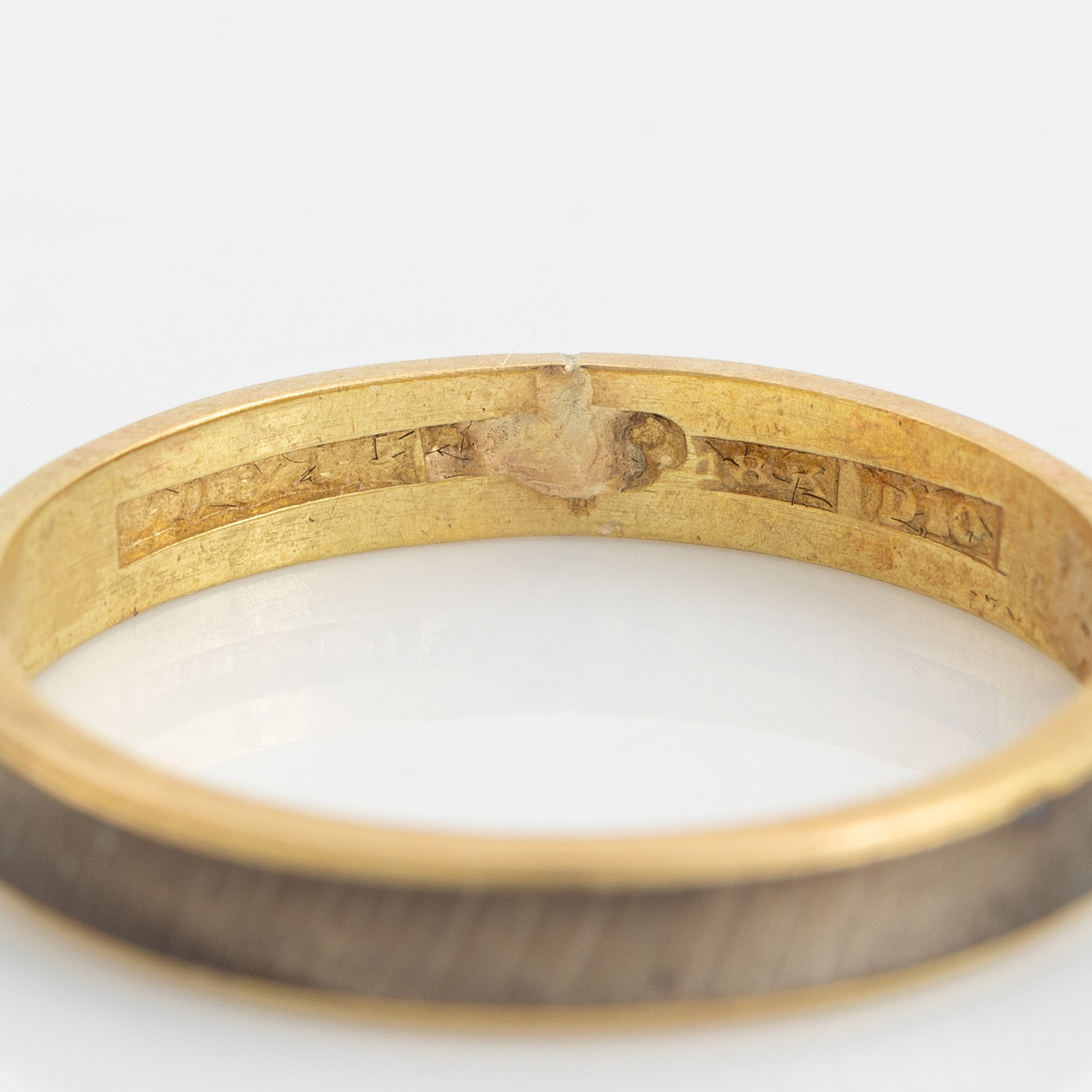 18K and 20K gold. - Bukowskis