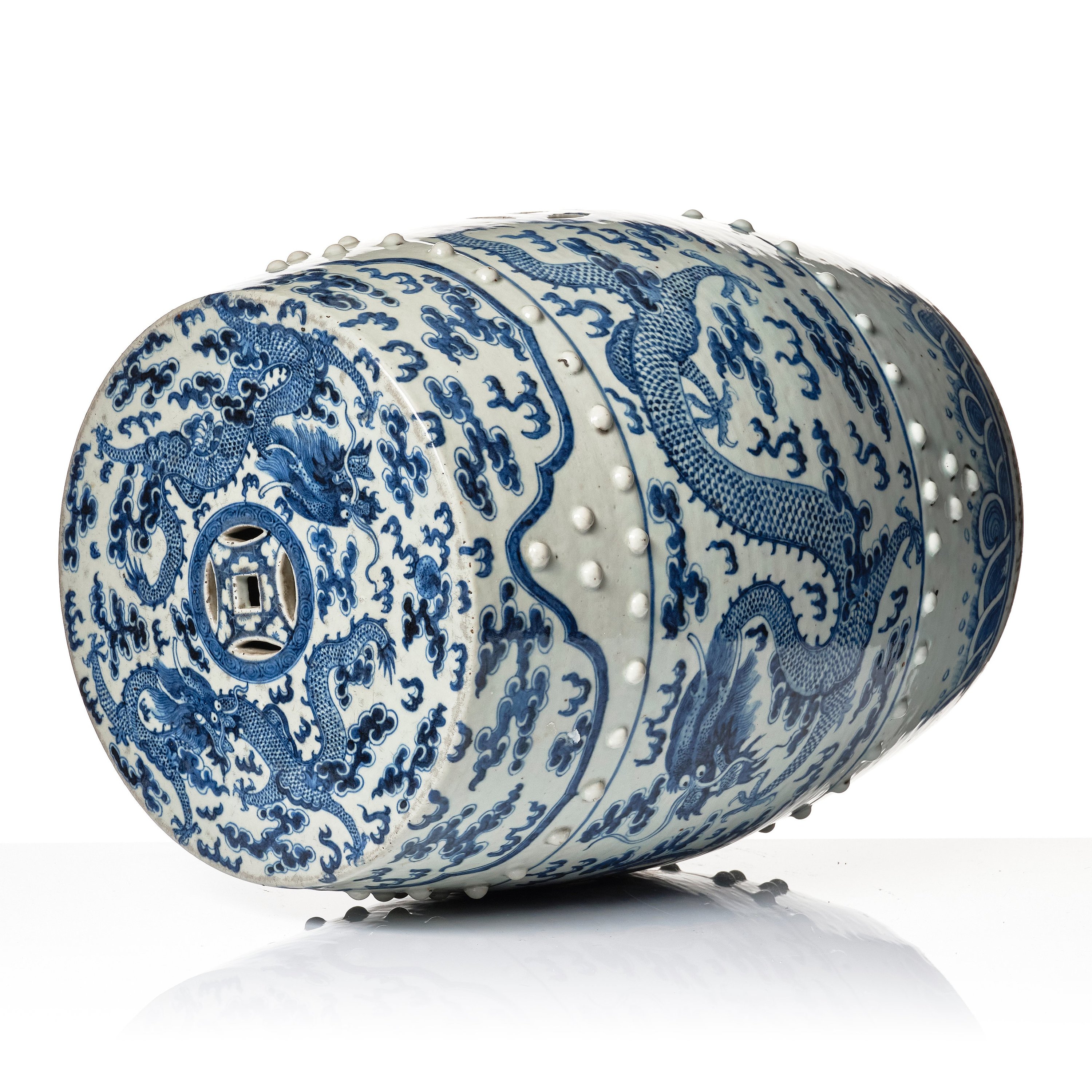 A blue and white four clawed dragon garden seat, Qing dynasty, 19th ...