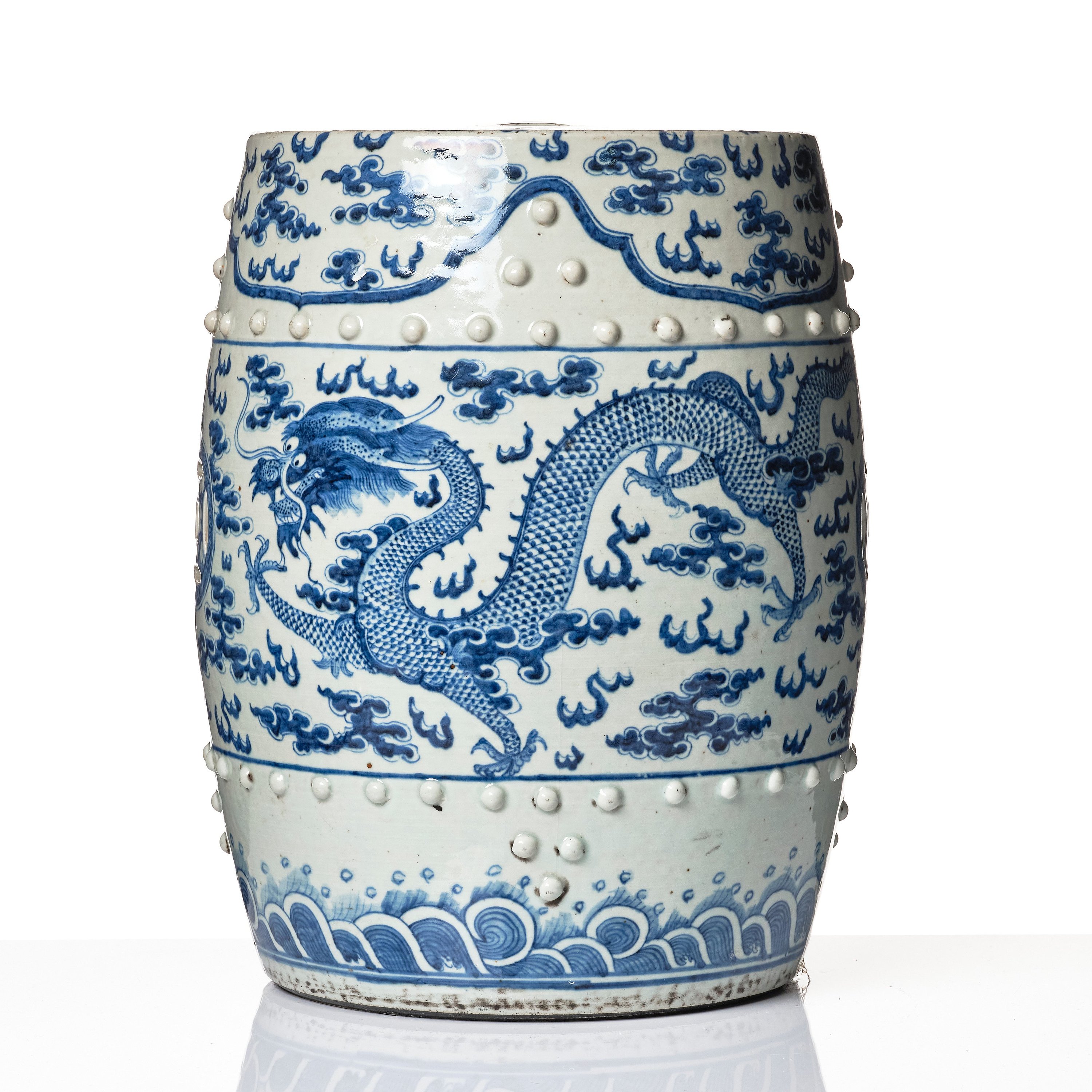 A blue and white four clawed dragon garden seat, Qing dynasty, 19th ...