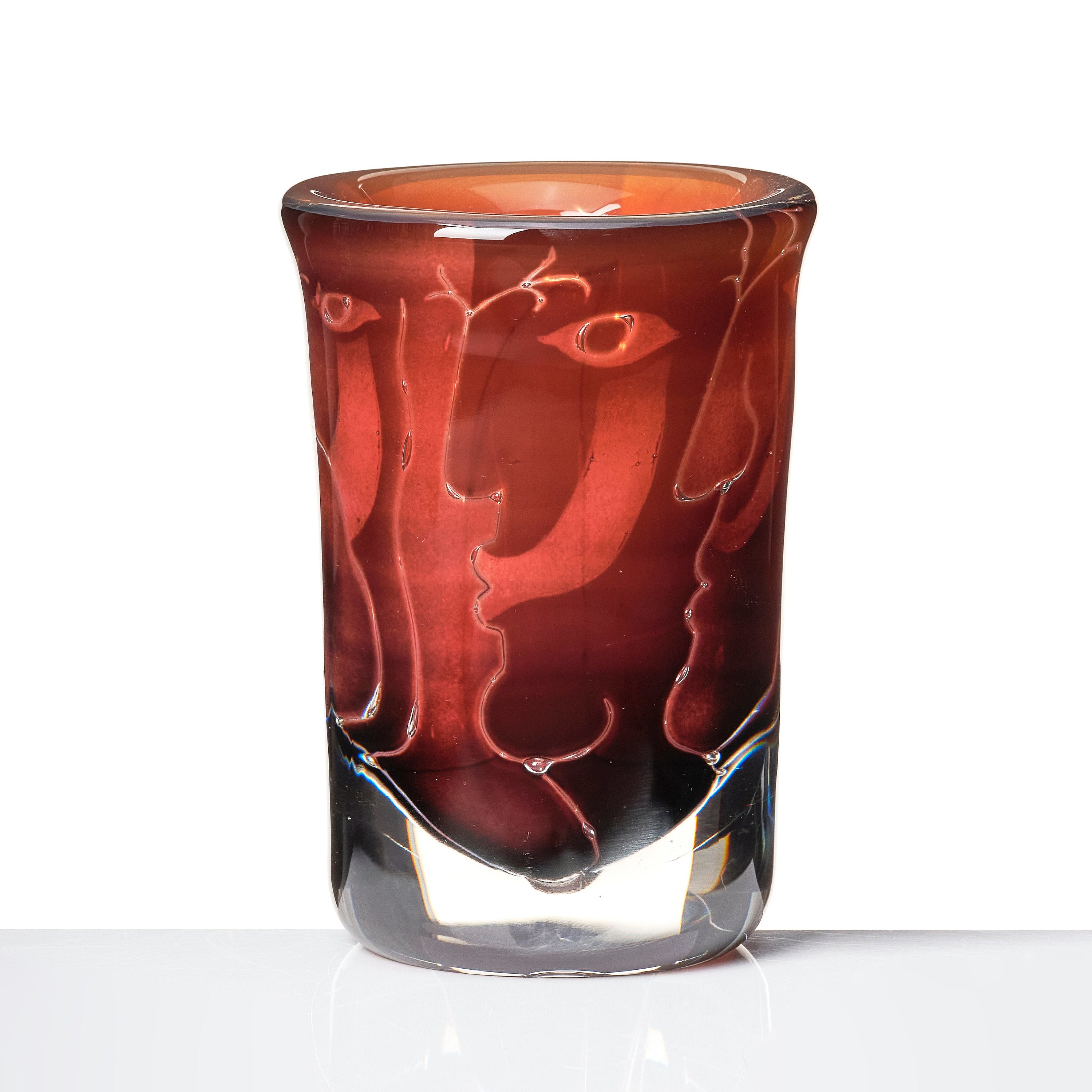 Ingeborg Lundin, a burgundy ariel glass vase 'Ansikten' (Faces ...
