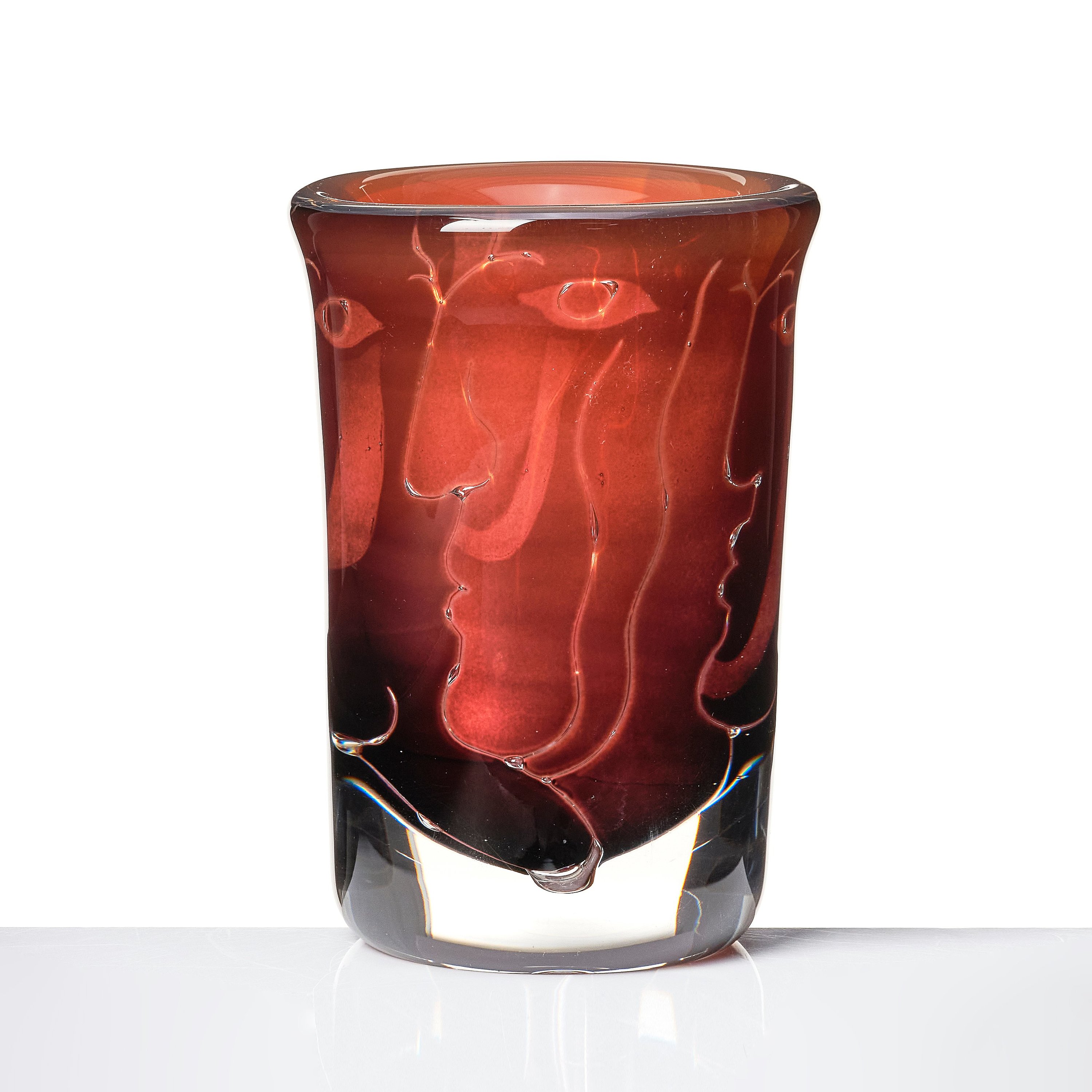 Ingeborg Lundin, a burgundy ariel glass vase 'Ansikten' (Faces ...