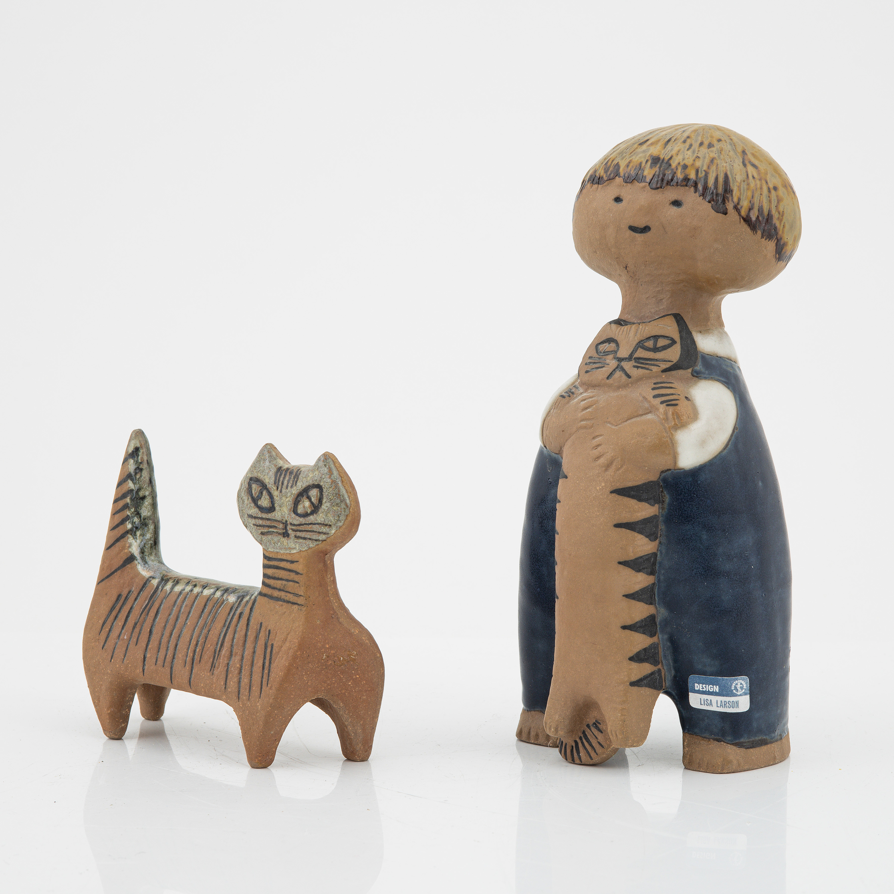 Lisa Larson, a set of two stoneware figurines from Gustavsberg. - Bukowskis