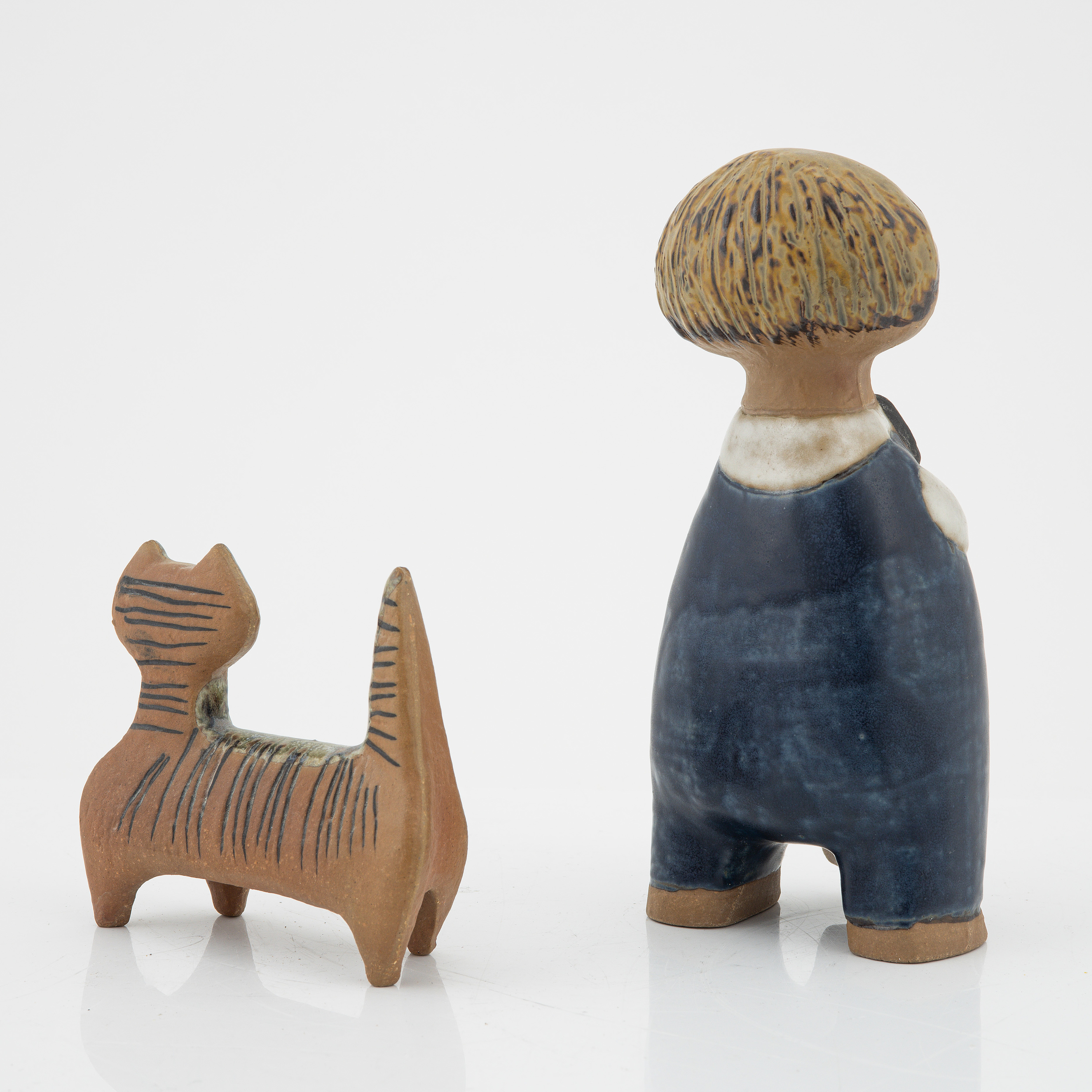 Lisa Larson, a set of two stoneware figurines from Gustavsberg. - Bukowskis