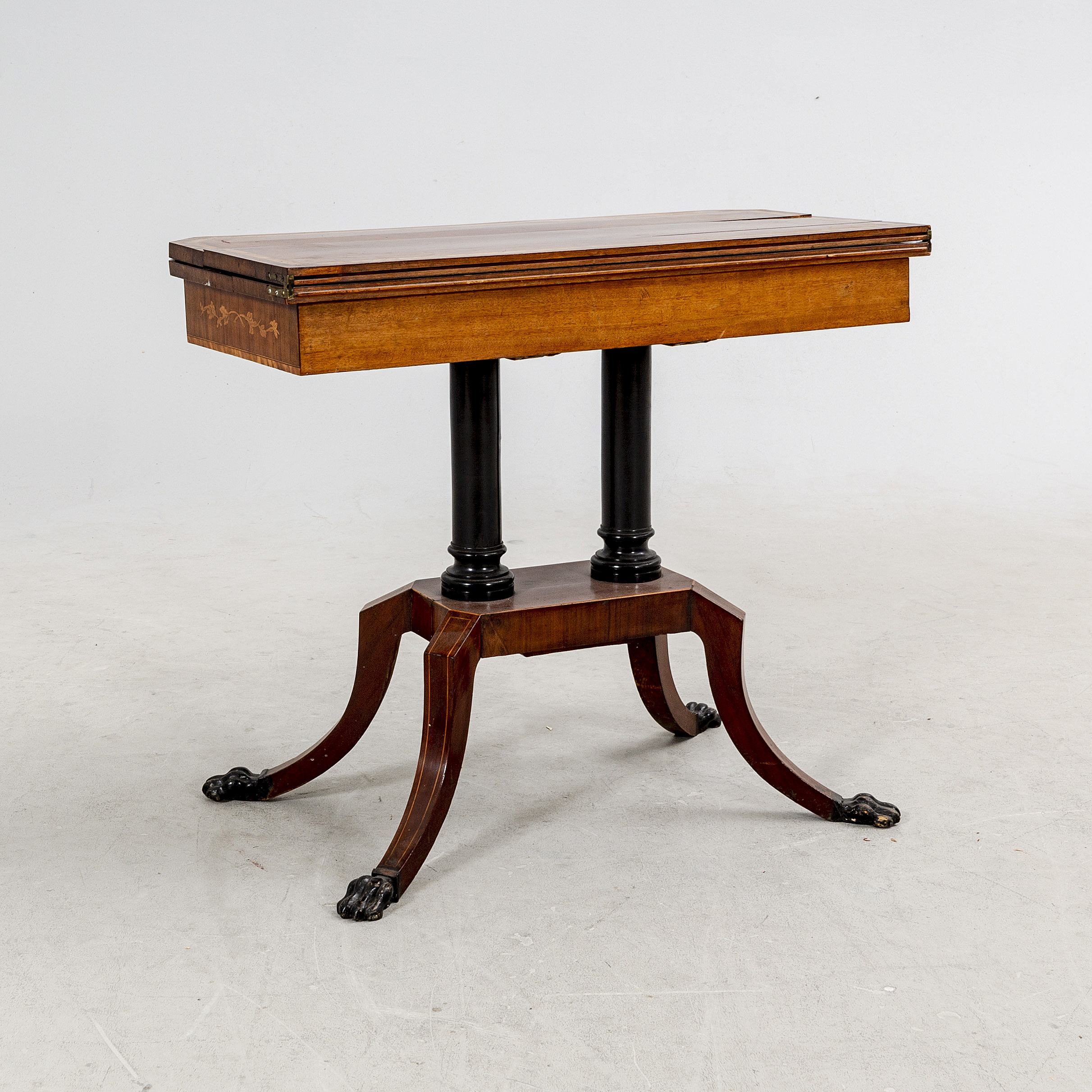 A mid 1800 late Empire game table. - Bukowskis