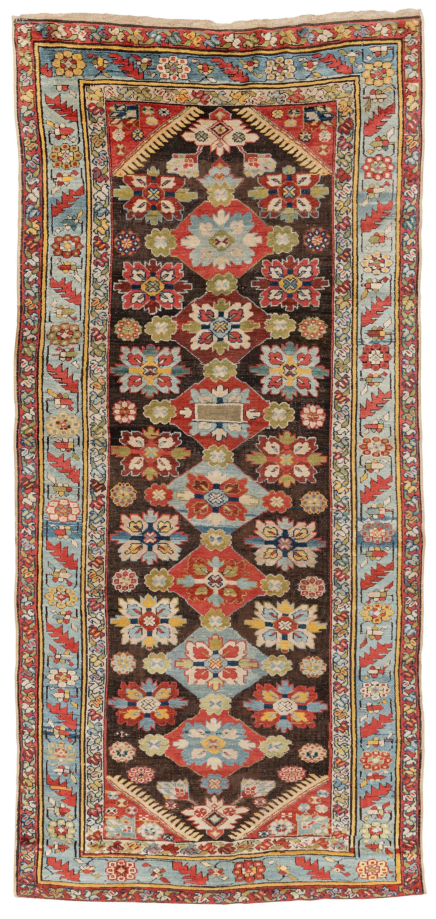An antique Karabagh carpet, ca 330 x 157 cm (one end with 1-3 cm flat ...