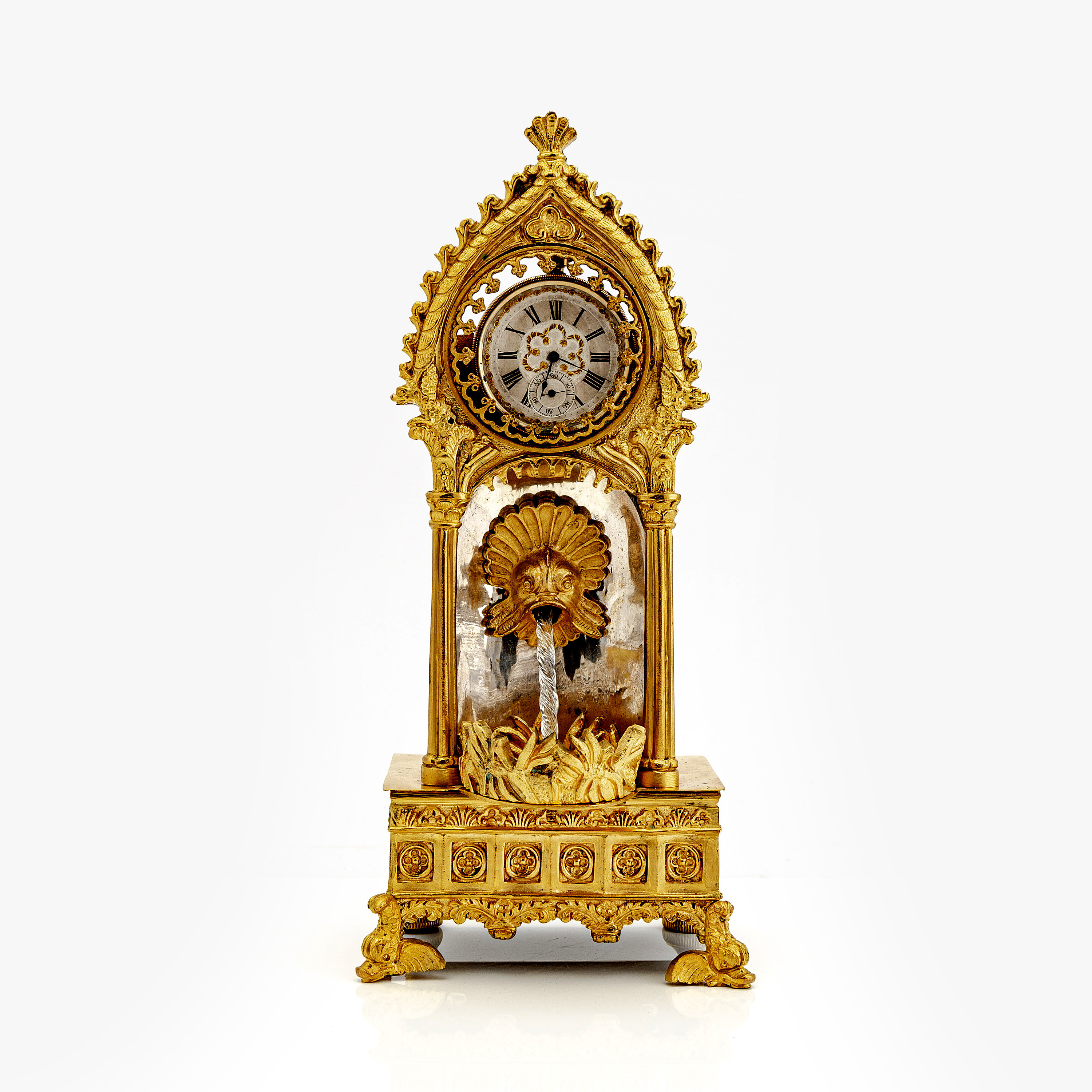A mid 1800s gilded bronze pocket watch stand and pocket watch. - Bukowskis