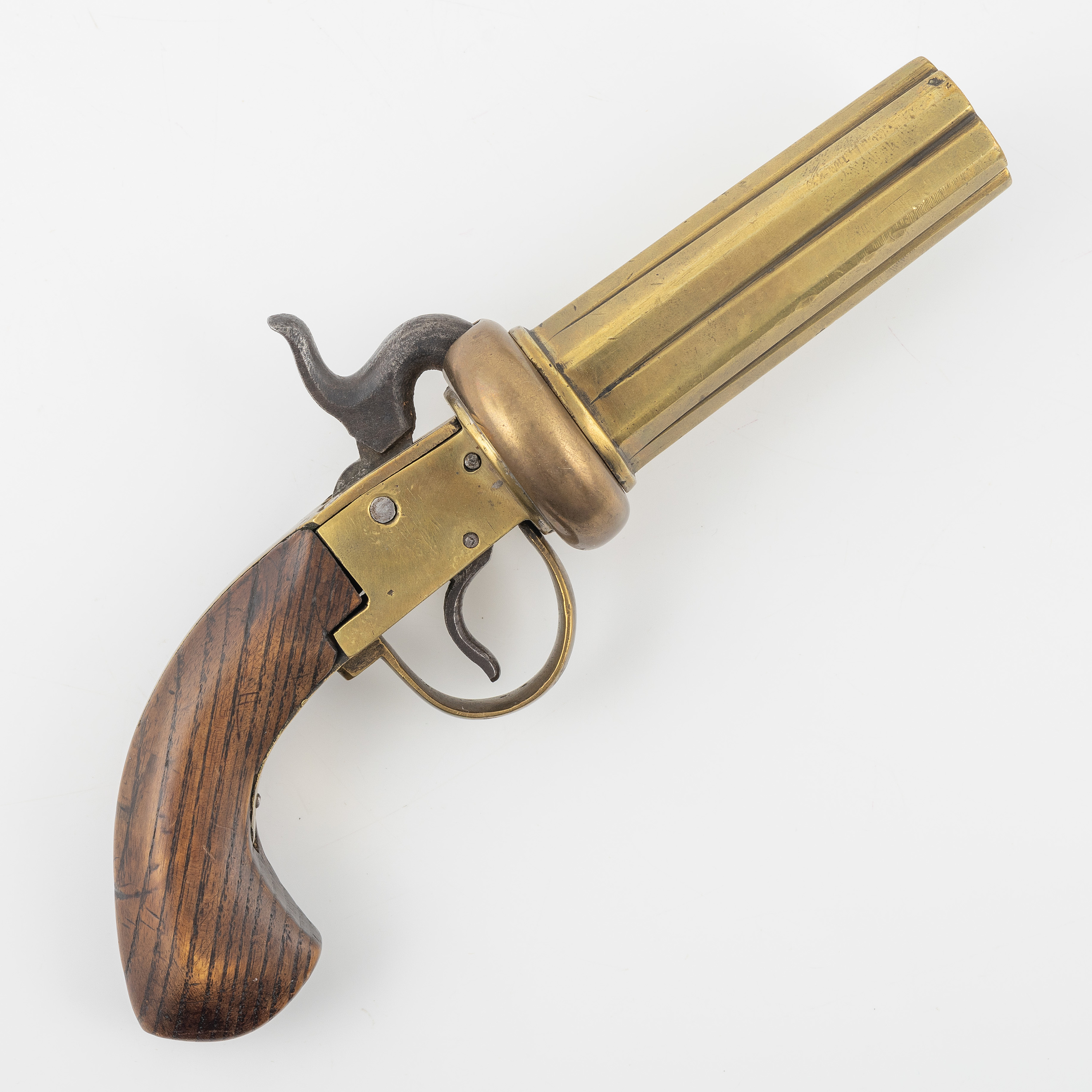 A brass percussion revolver by Anders Gustafsson (1835-1924). - Bukowskis