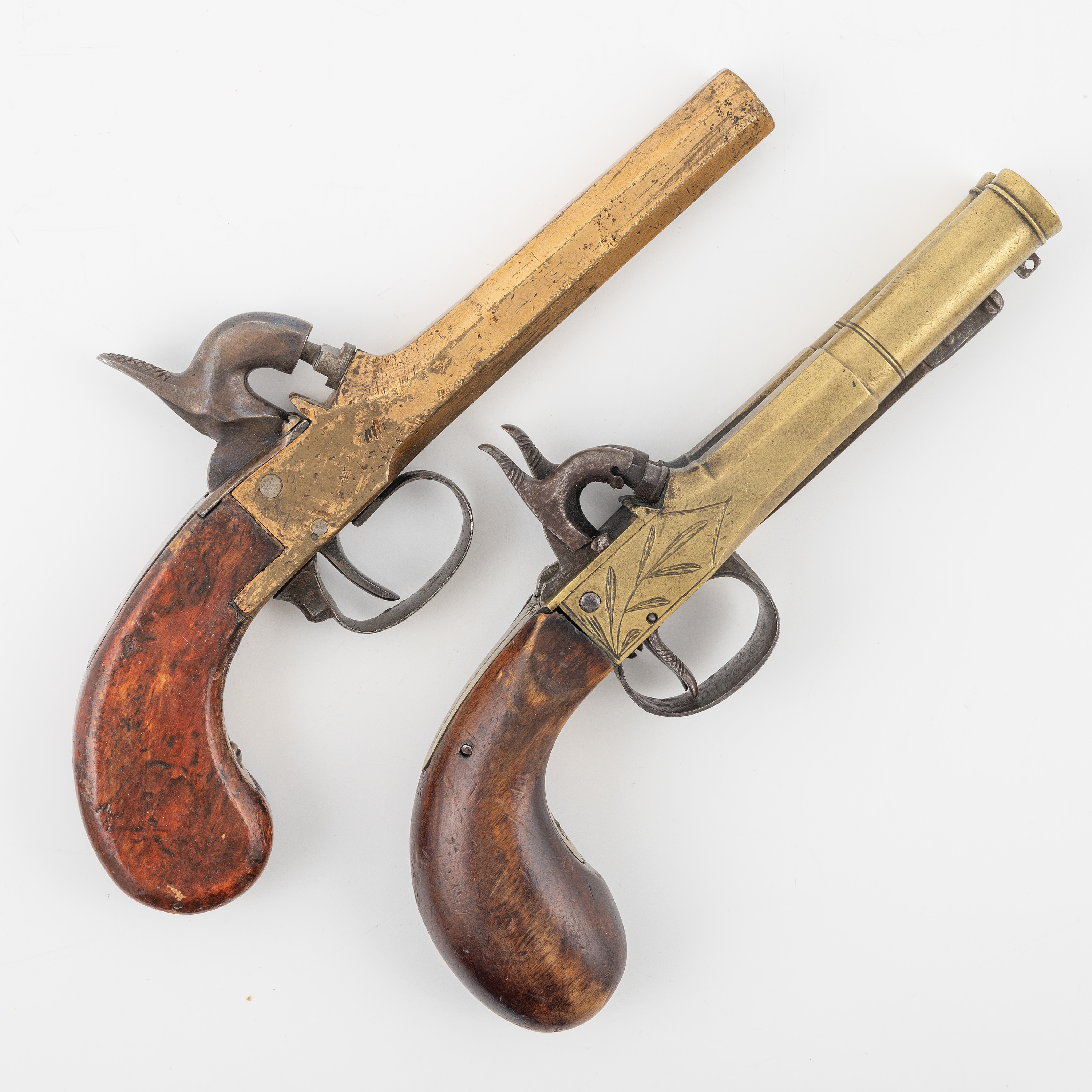Two brass percussion pistols, 19th Century. - Bukowskis