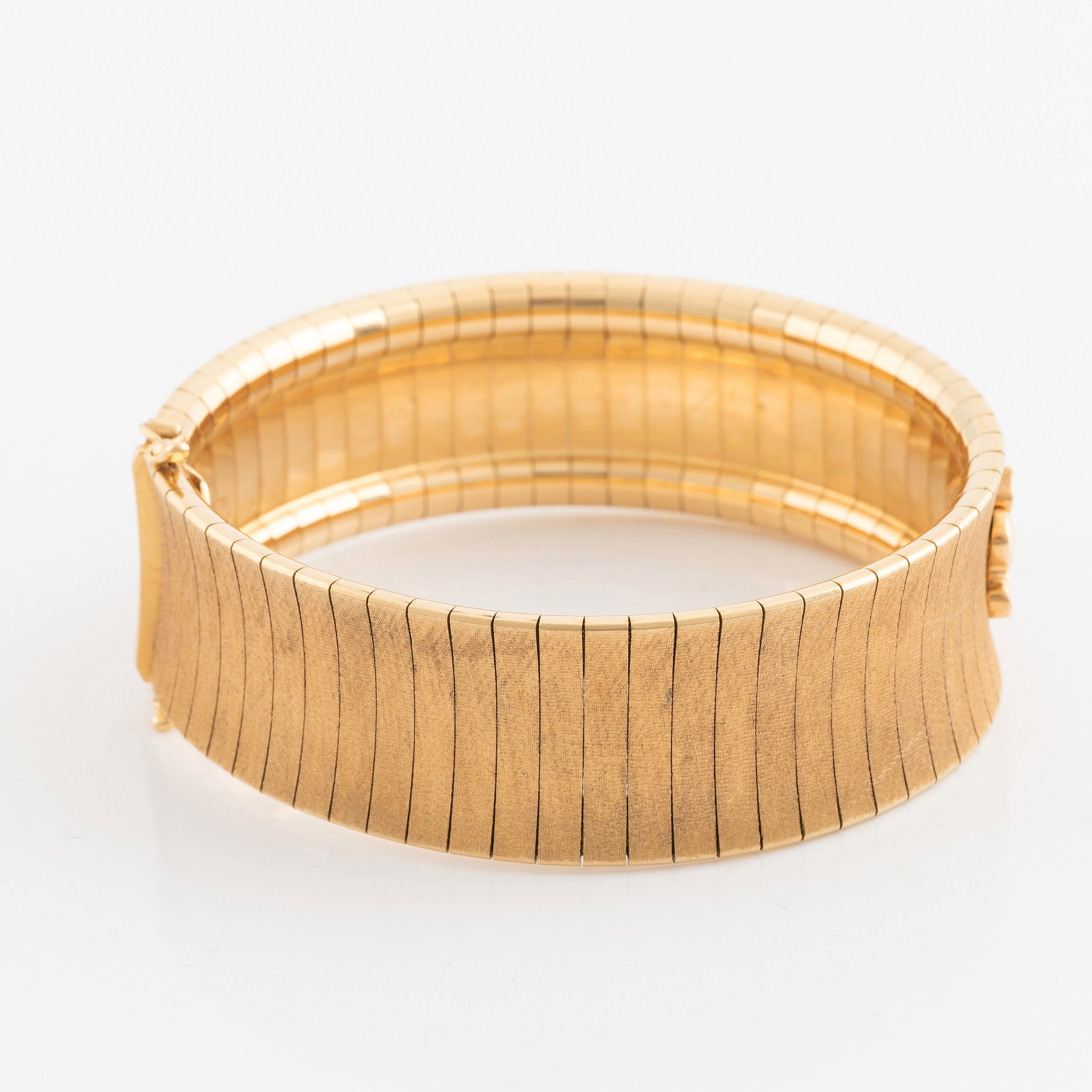 An 18K gold bracelet. - Bukowskis