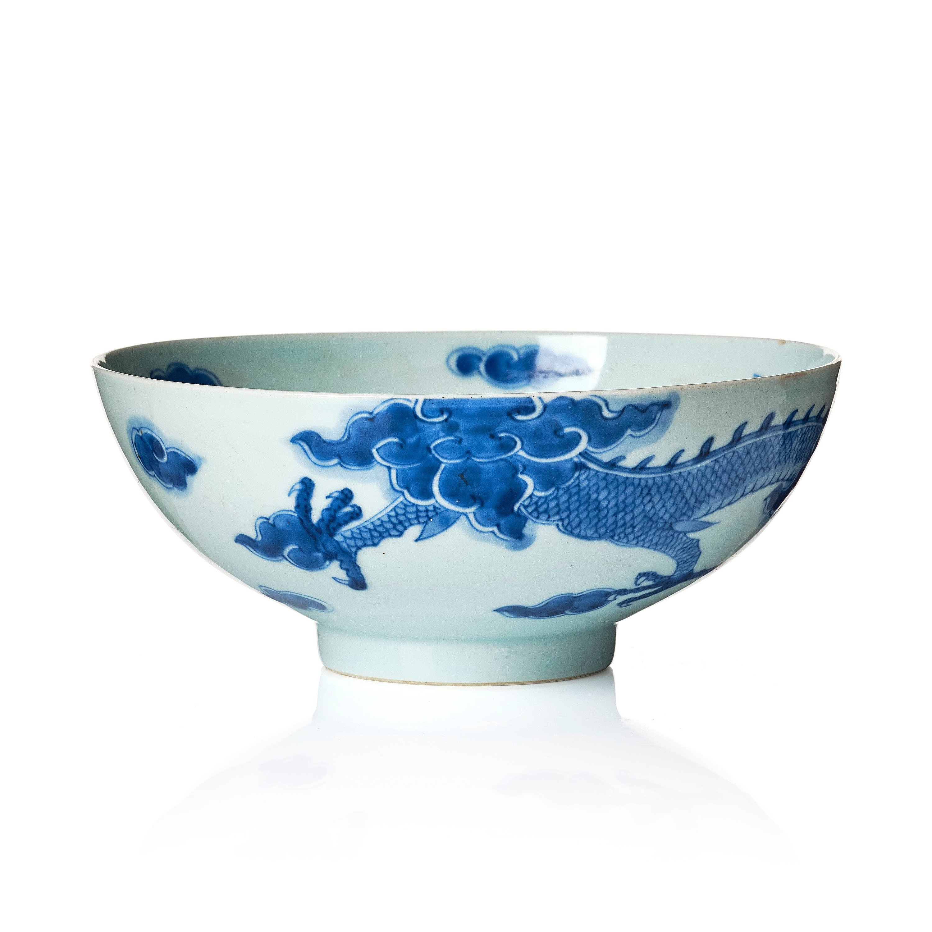 A blue and white four clawed dragon bowl, Qing dynasty, 18th Century ...