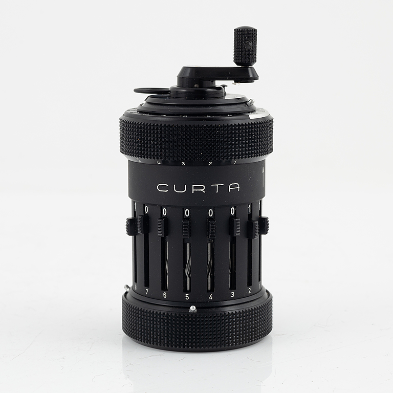 A Curta Type I mechanical calculator. - Bukowskis