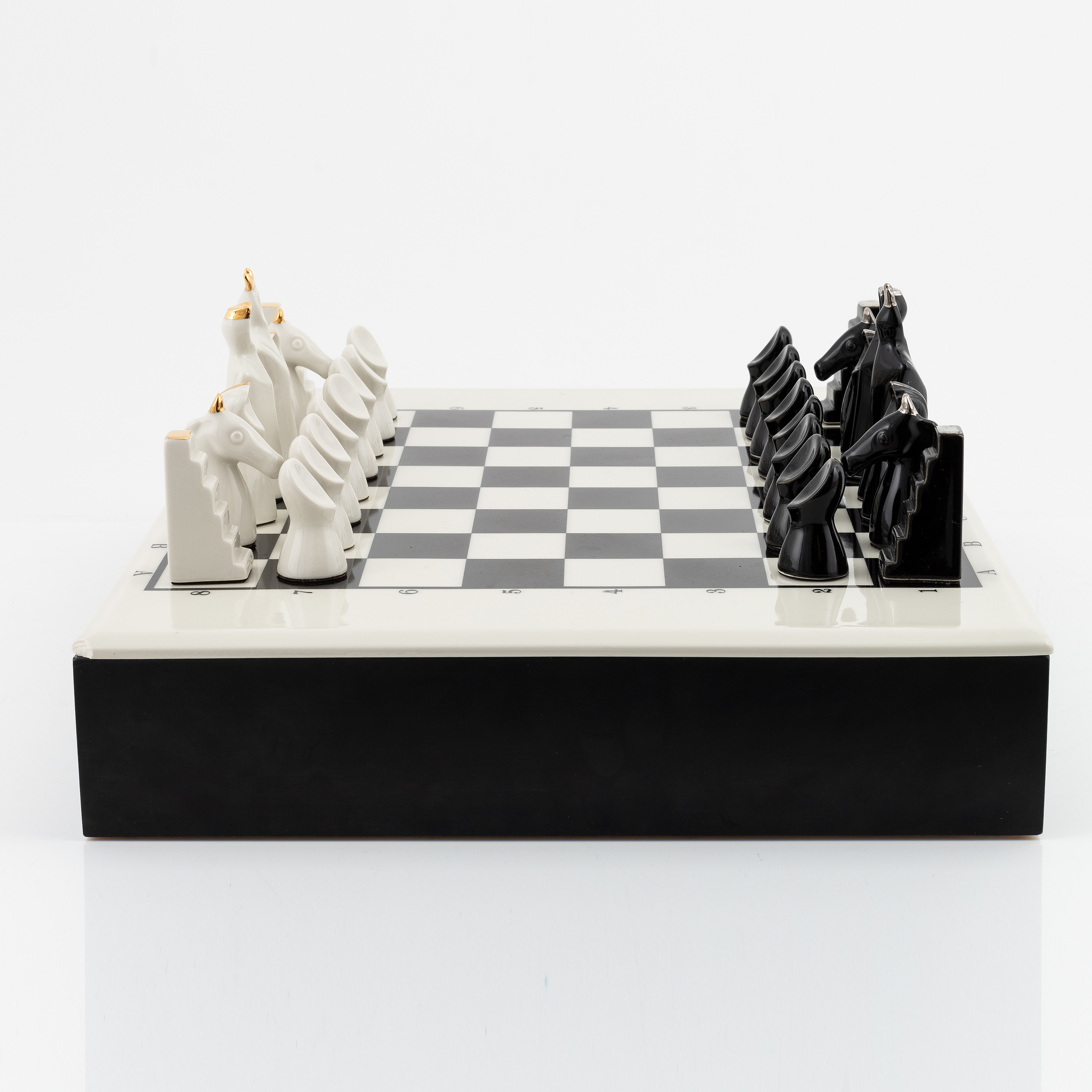 Pauli Partanen, a porcelaine chess set, Arabia, Finland. - Bukowskis