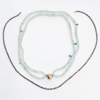 Ole Lynggaard, Two pearls colliers and one lock, 14K gold, diamond ca ...