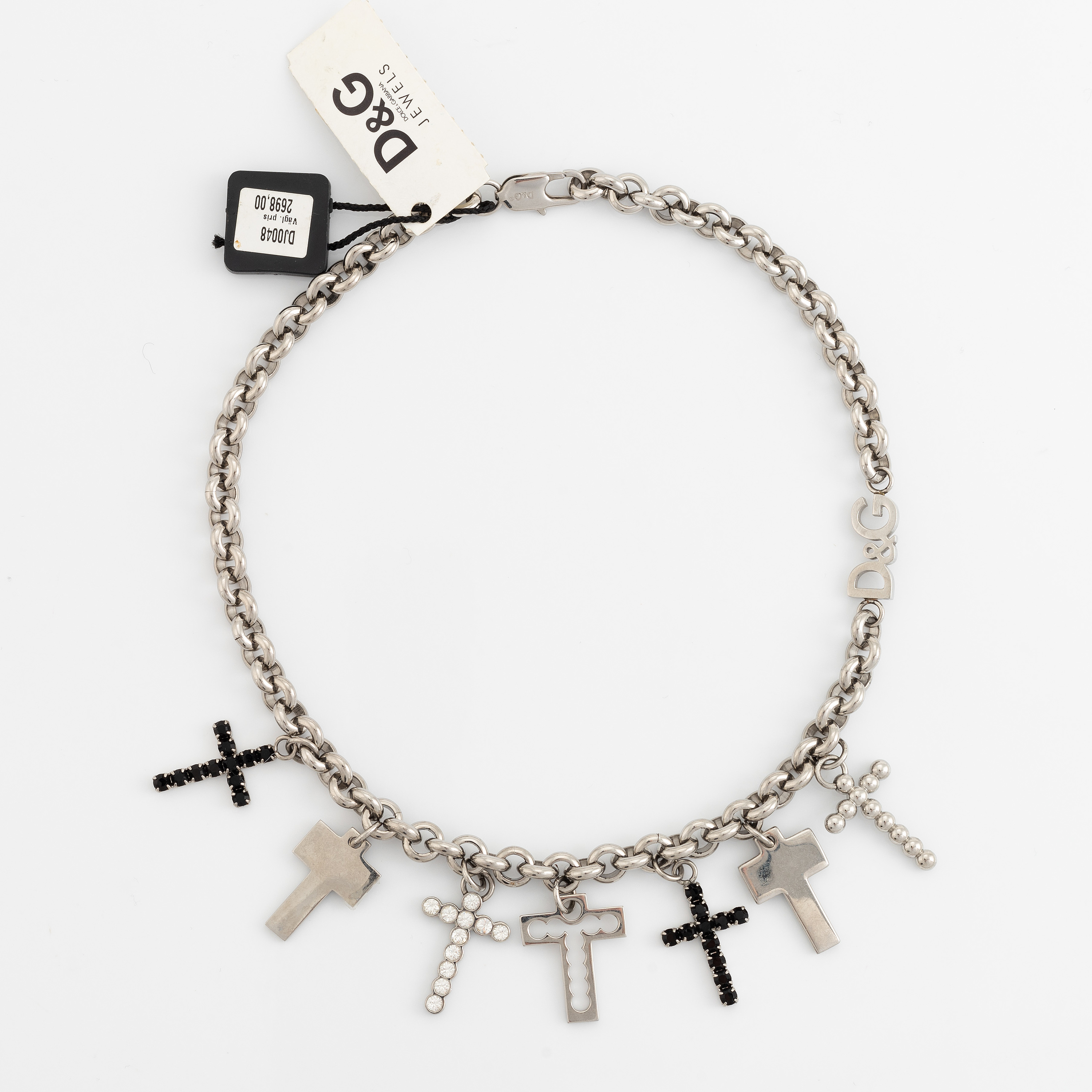 Dolce & Gabbana, collier, bijouteri, vitmetall med strass. - Bukowskis