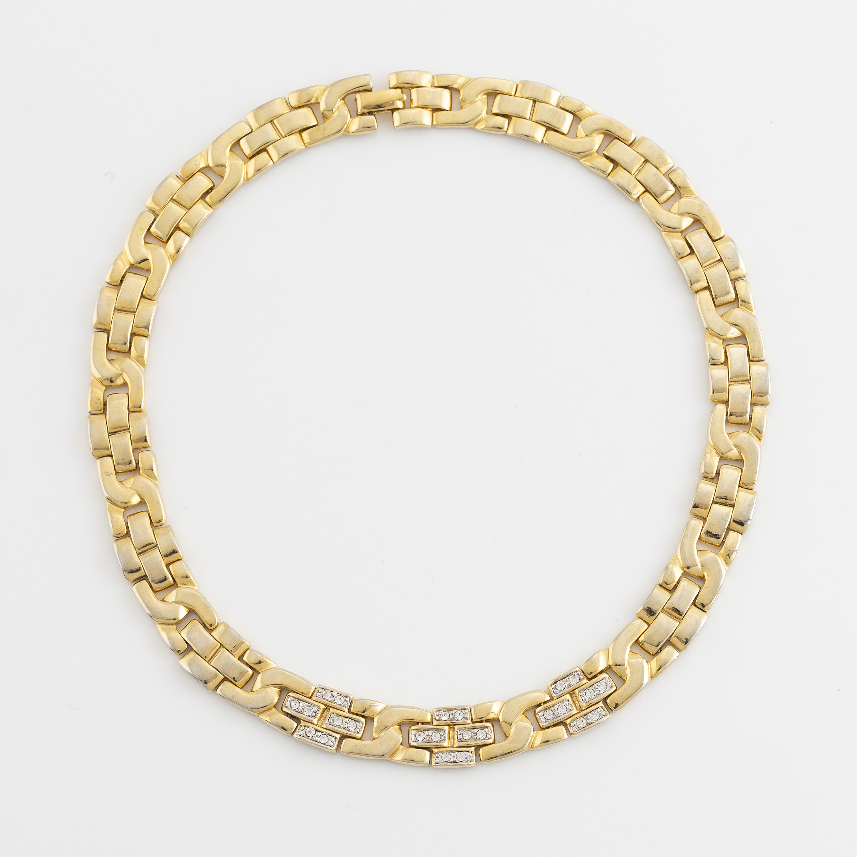 Oscar de la Renta armband, bijouteri, gulmetall med strass. - Bukowskis