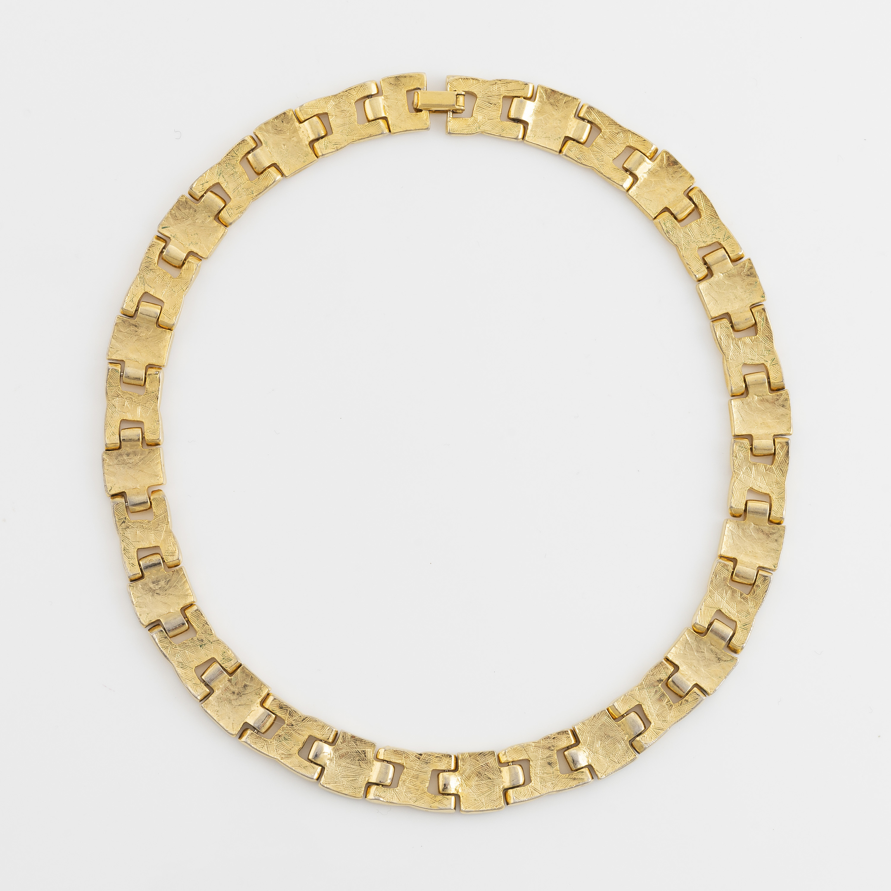 Oscar de la Renta armband, bijouteri, gulmetall med strass. - Bukowskis