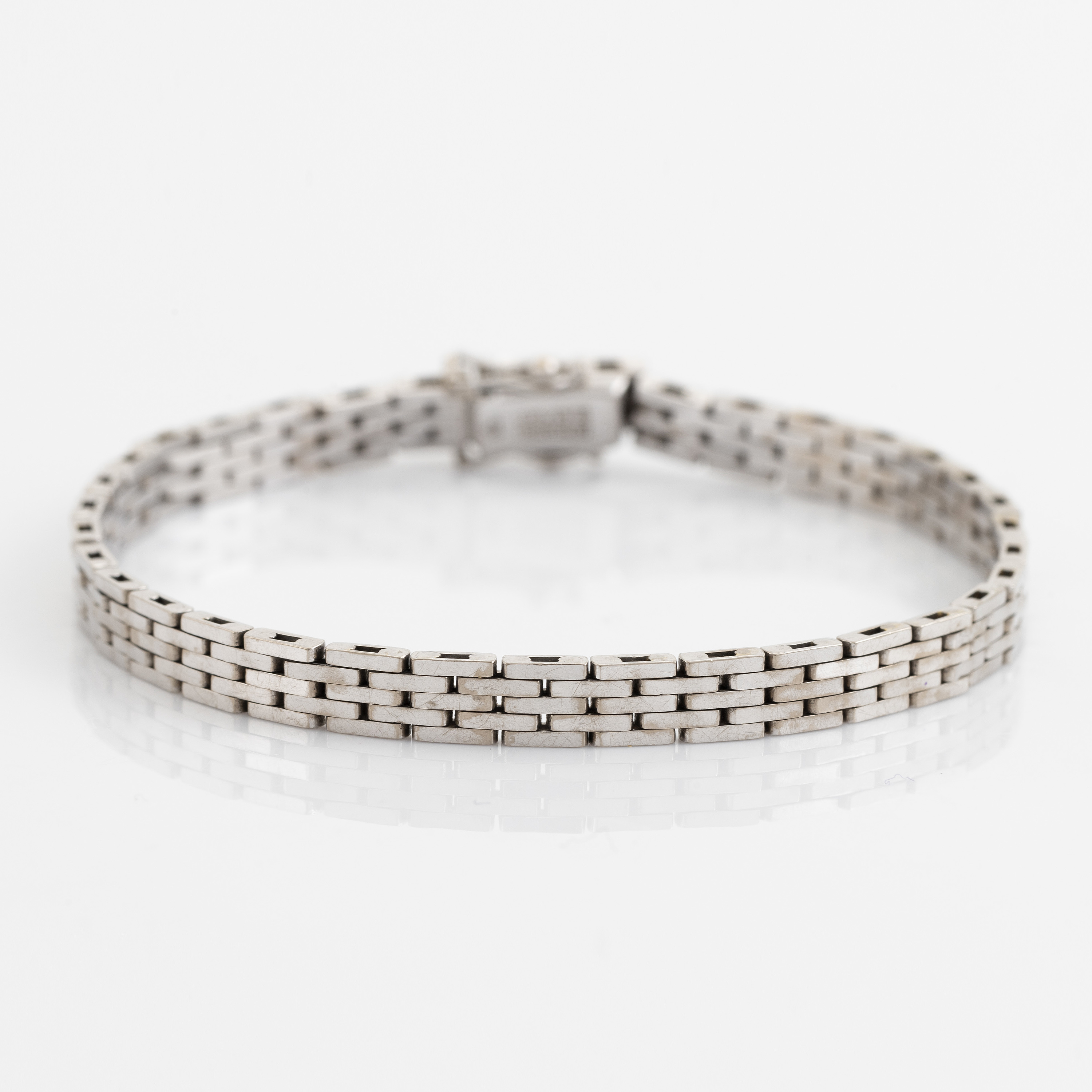 Armband, 18K vitguld. - Bukowskis