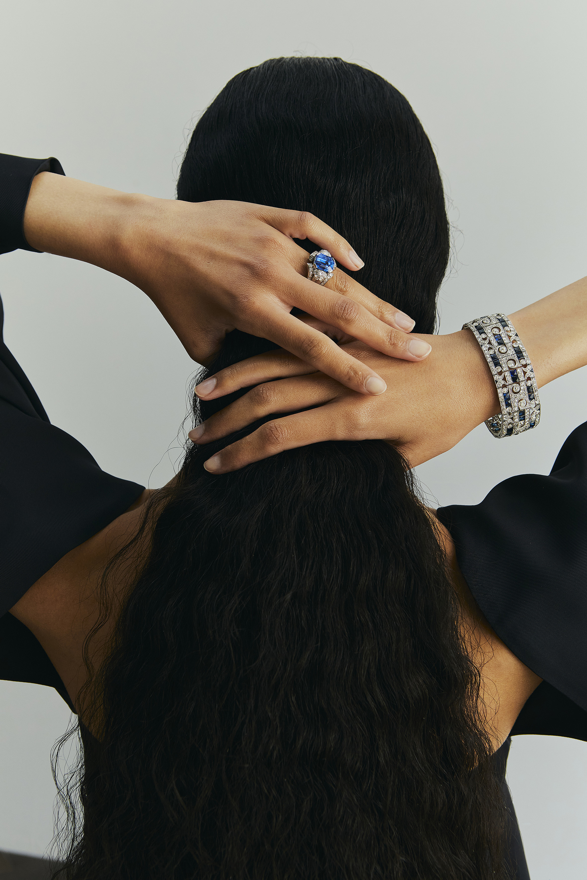 A WA Bolin platinum ring set with a faceted sapphire and old- and eight ...