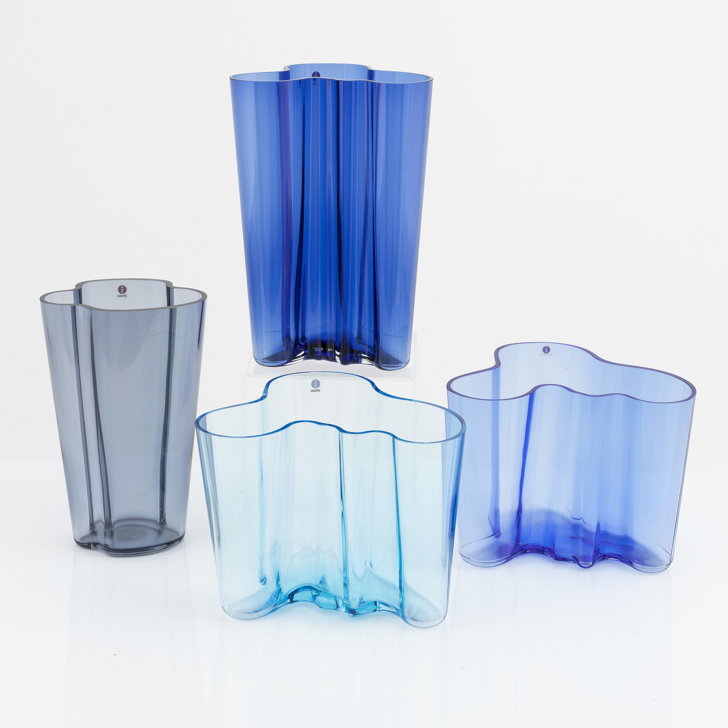 Alvar Aalto, four glass vases, Iittala, Finland. - Bukowskis
