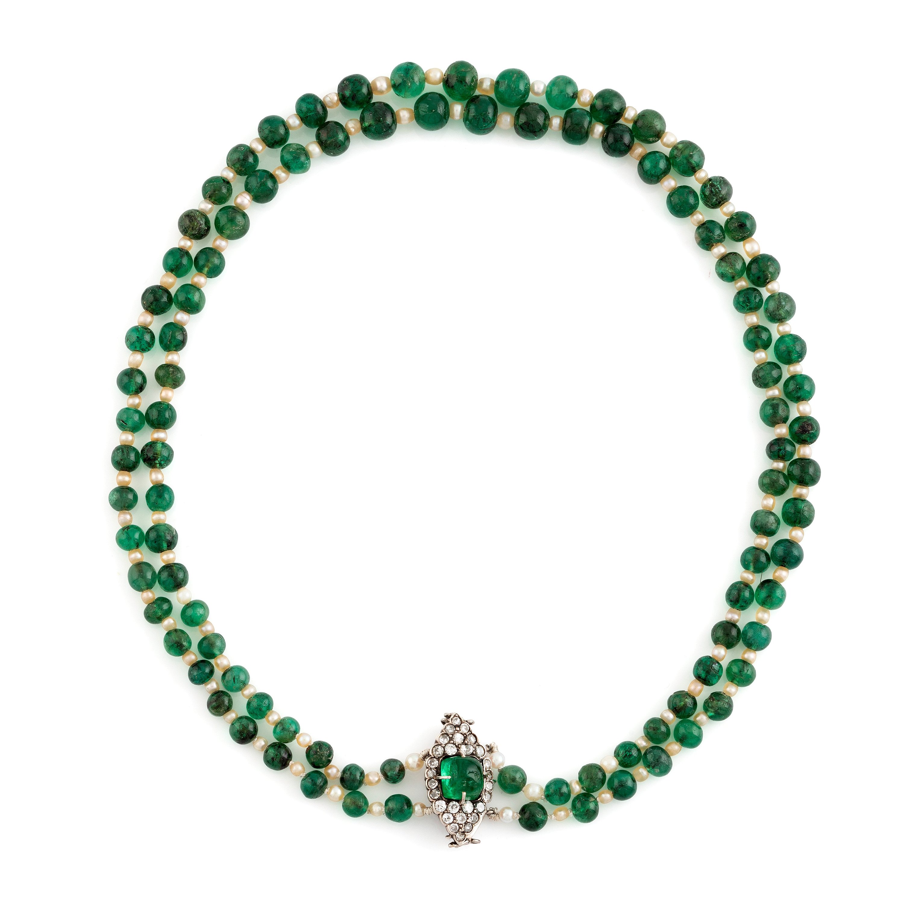 An emerald and pearl necklace with a silver clasp with a cabochon-cut ...