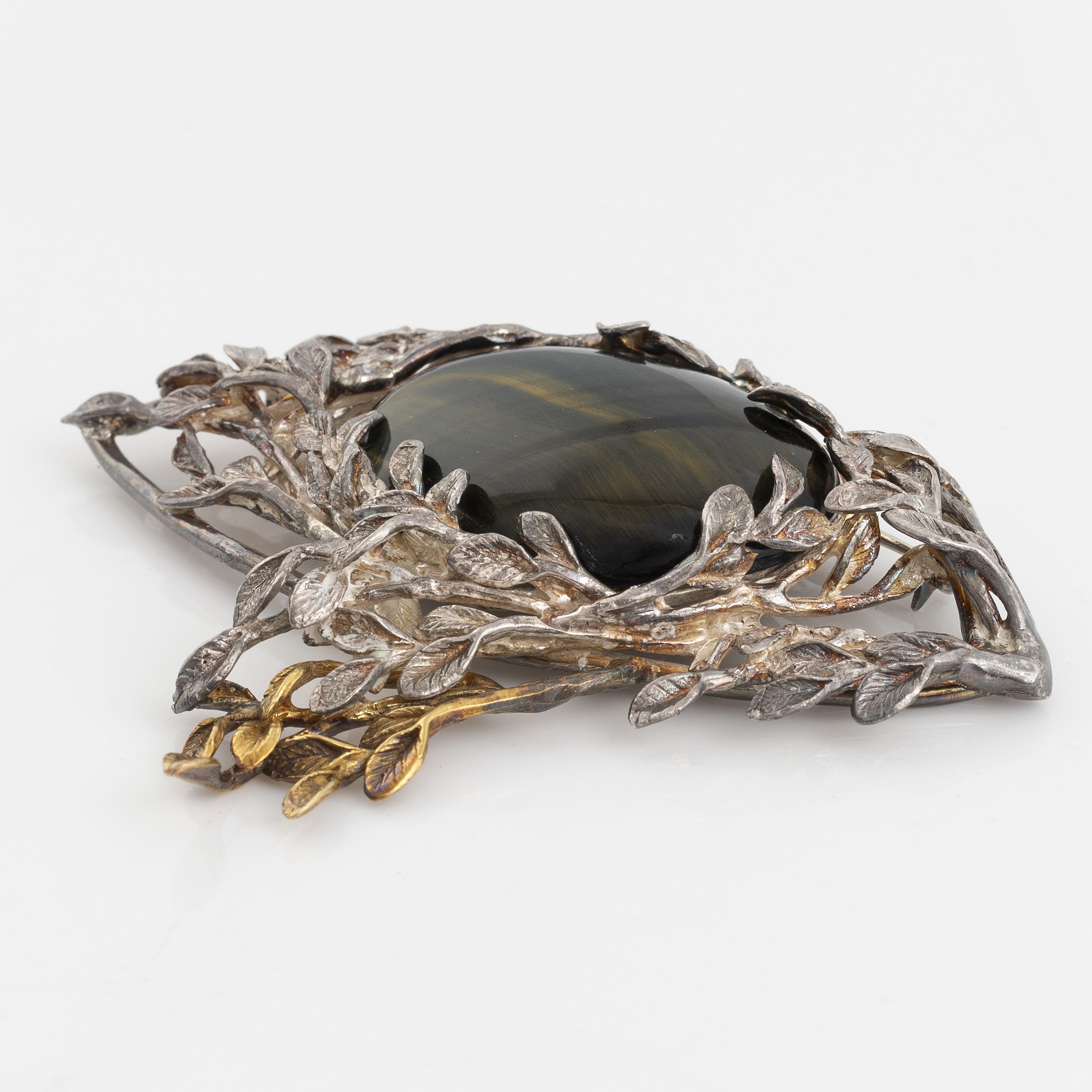 Etsuko Minowa,, silver and "hawk's eye" brooch. - Bukowskis
