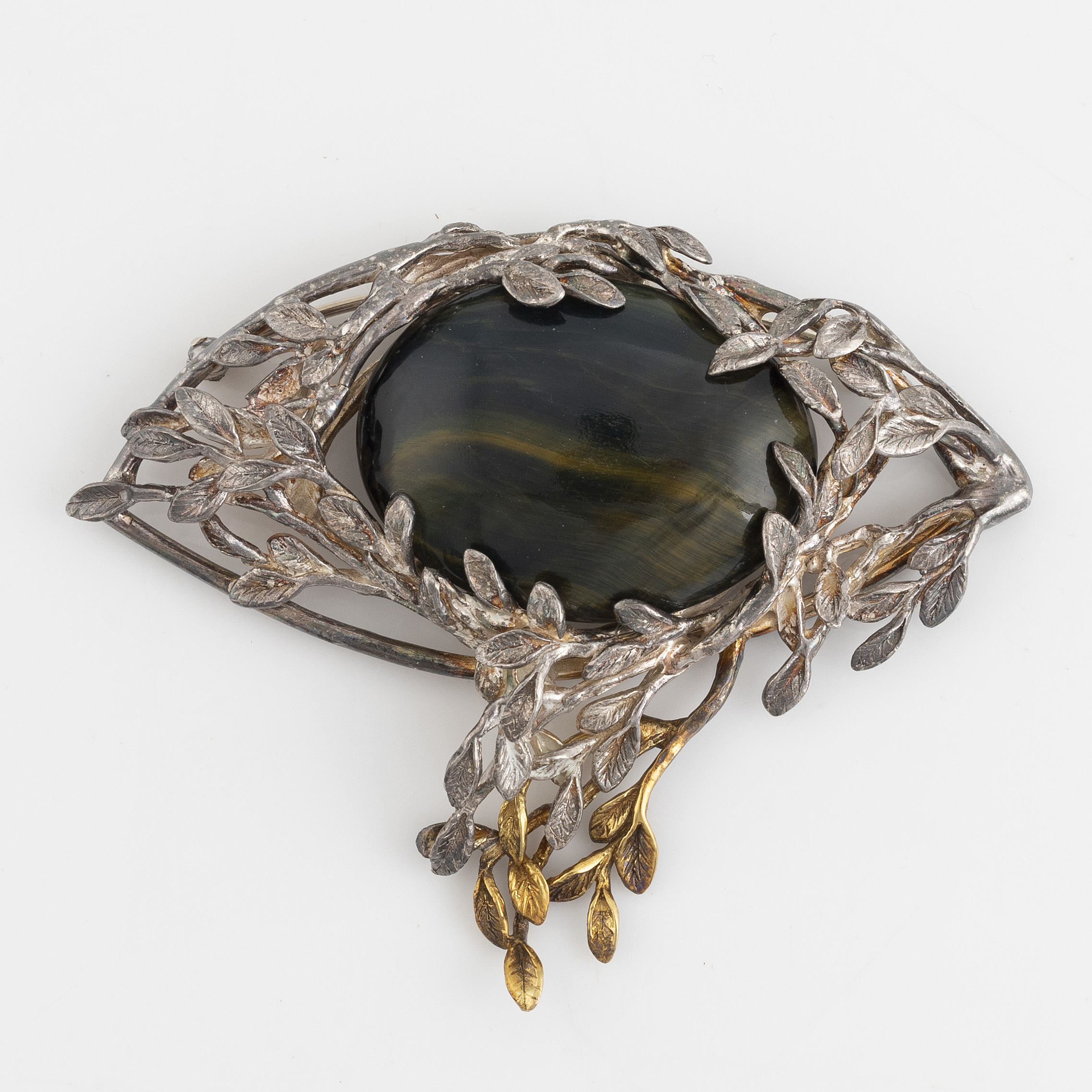 Etsuko Minowa,, silver and "hawk's eye" brooch. - Bukowskis