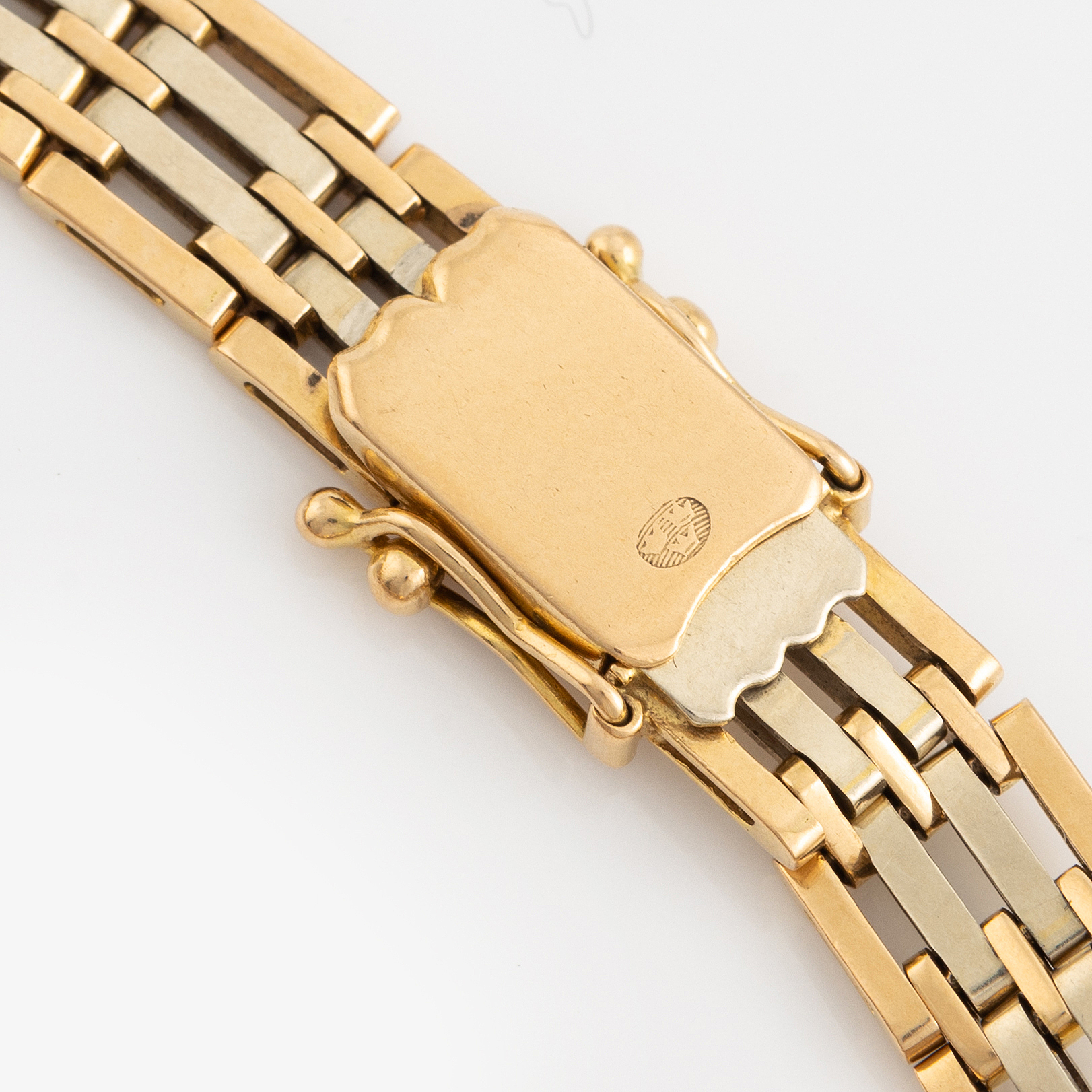 Armlänk, 18K gult och vitt guld. - Bukowskis