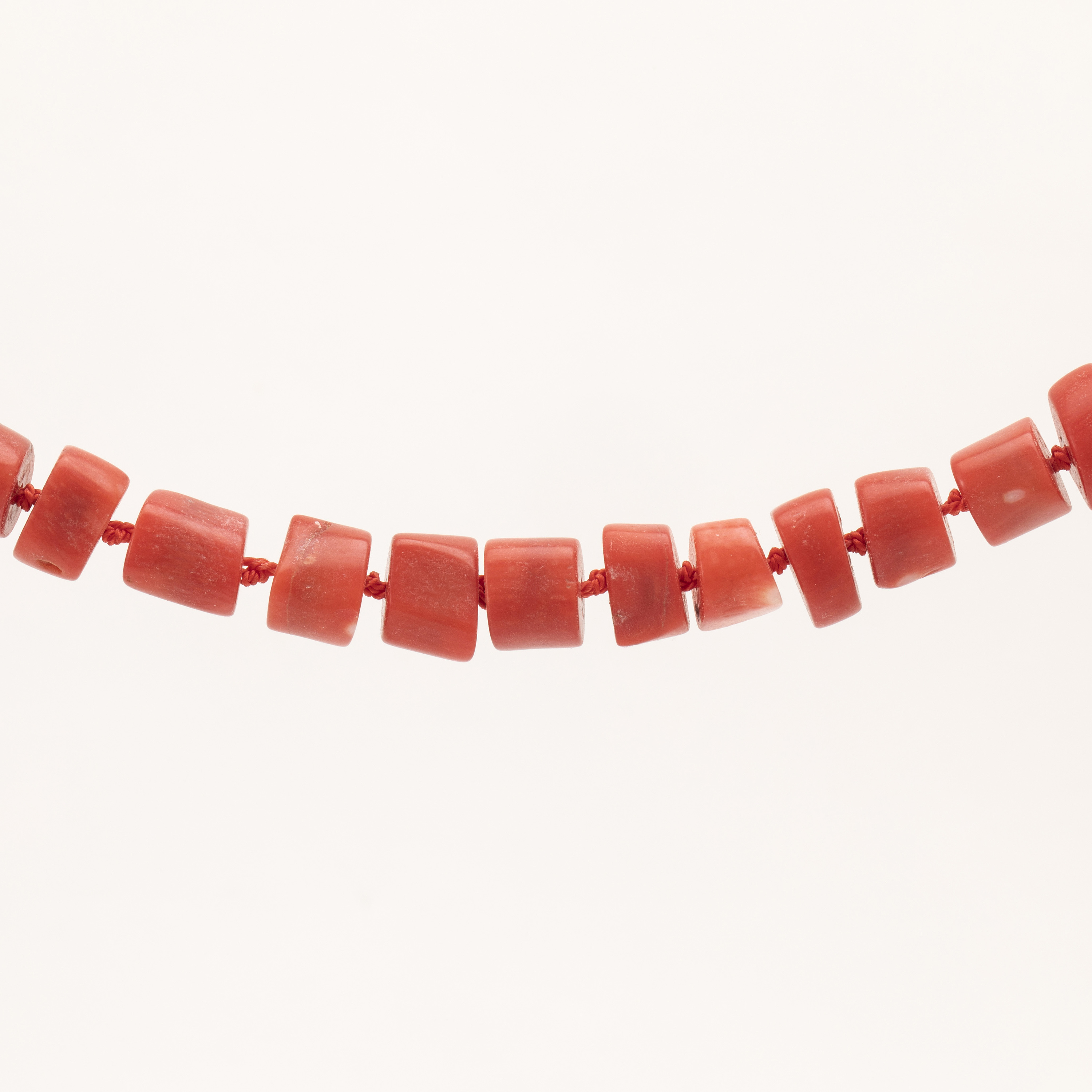 A 14K white and red gold lock with round brilliant cut diamonds and ...