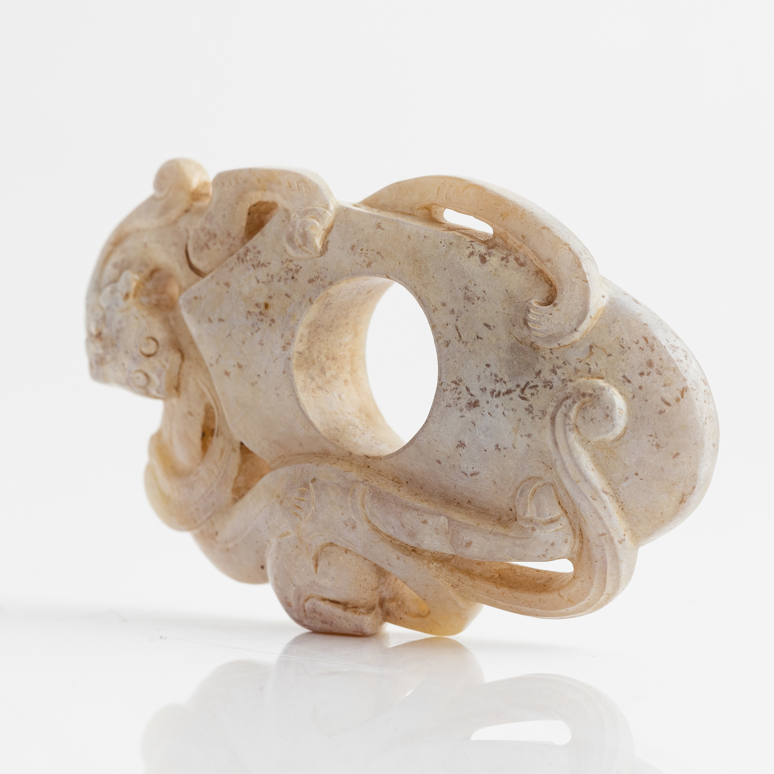 An archaistically carved nephrite sculpture, China, 20th Century ...