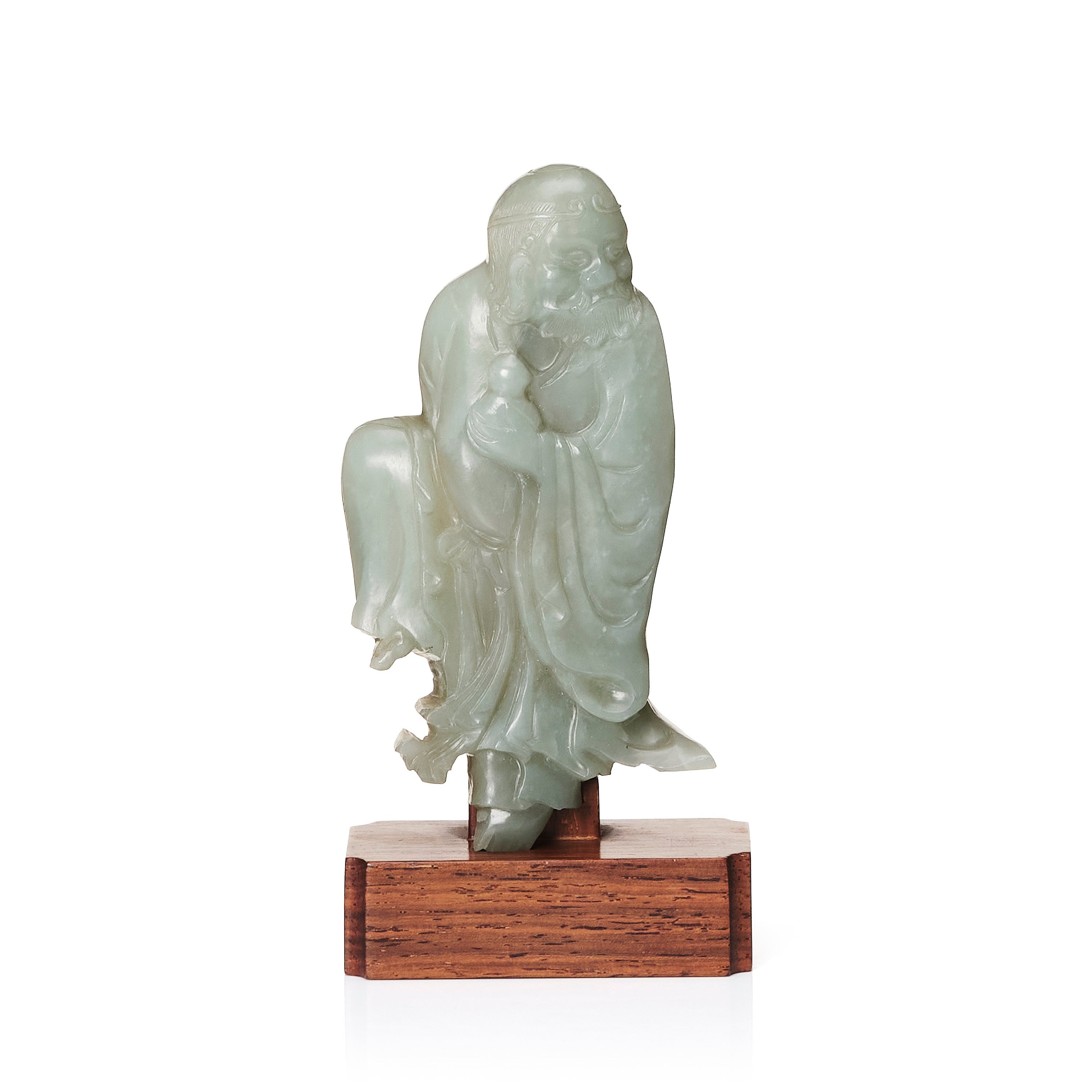 A carved nephrite sculpture of a lohan, Qing dynasty (1664-1912 ...