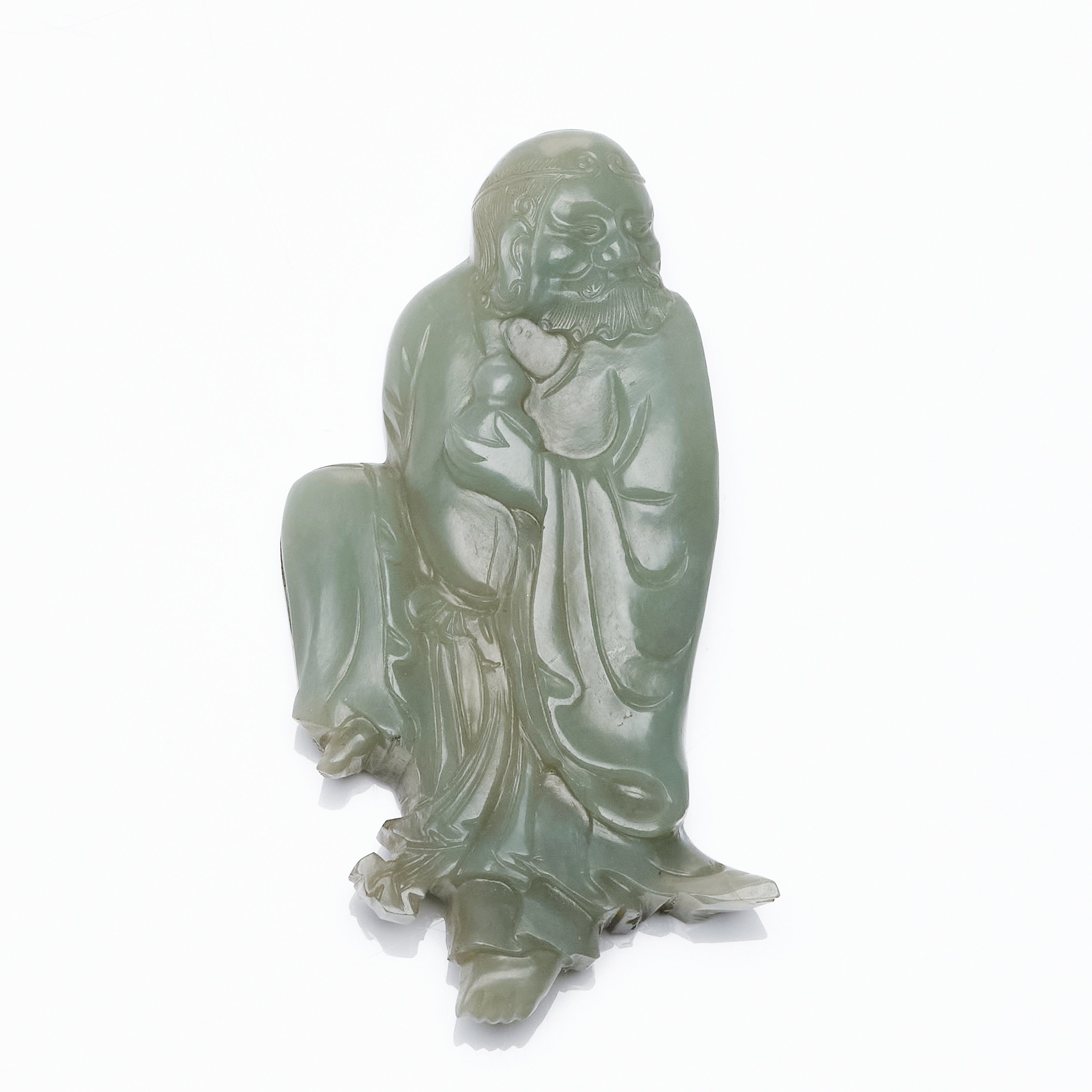A carved nephrite sculpture of a lohan, Qing dynasty (1664-1912 ...