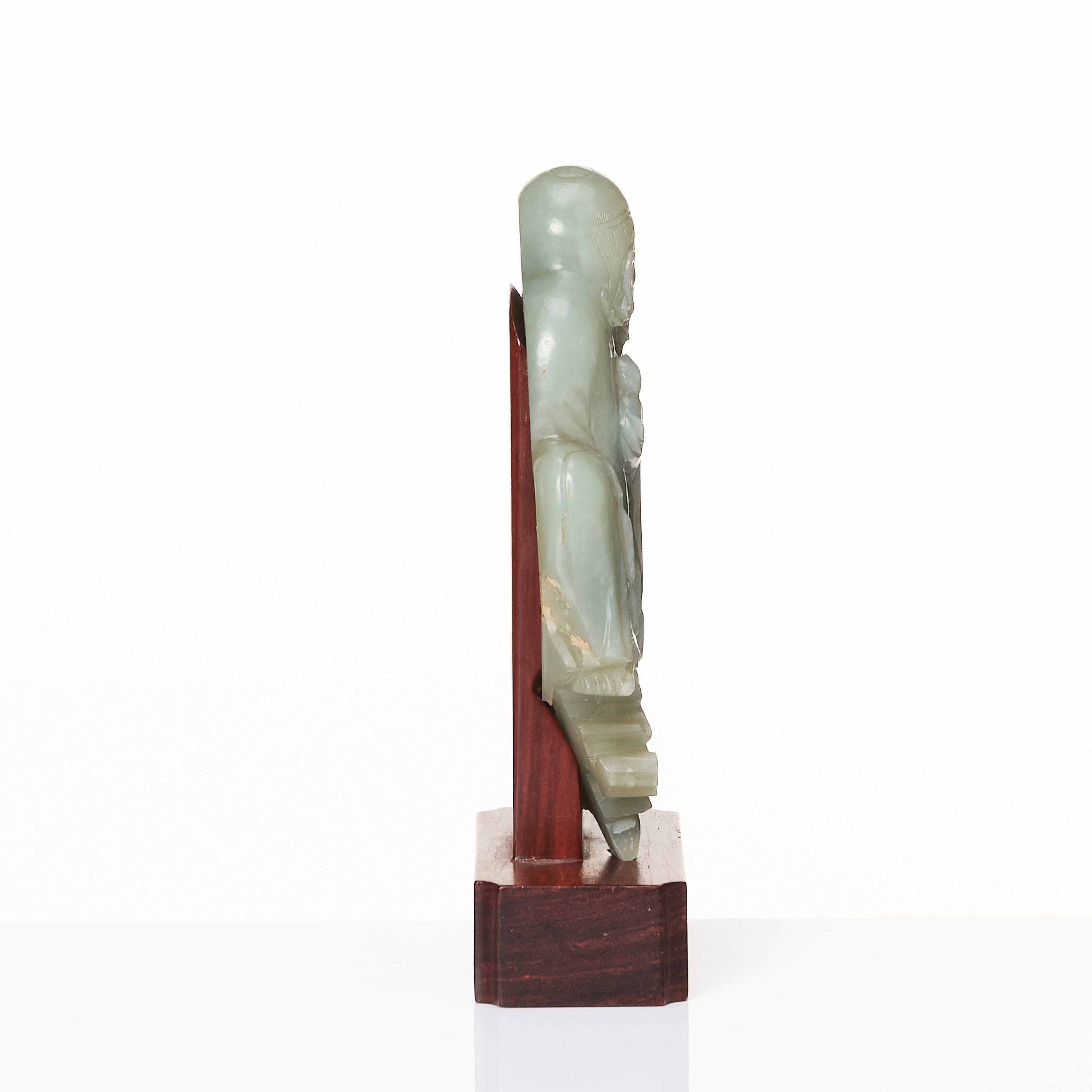 A carved nephrite sculpture of a lohan, Qing dynasty (1664-1912 ...