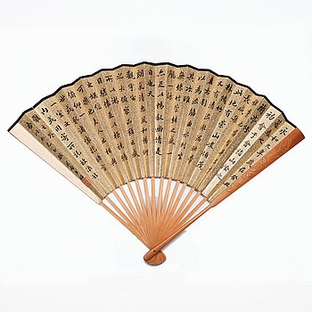 A Chinese fan signed Tang Xinyu, and dated to 1927 in an embroidered ...