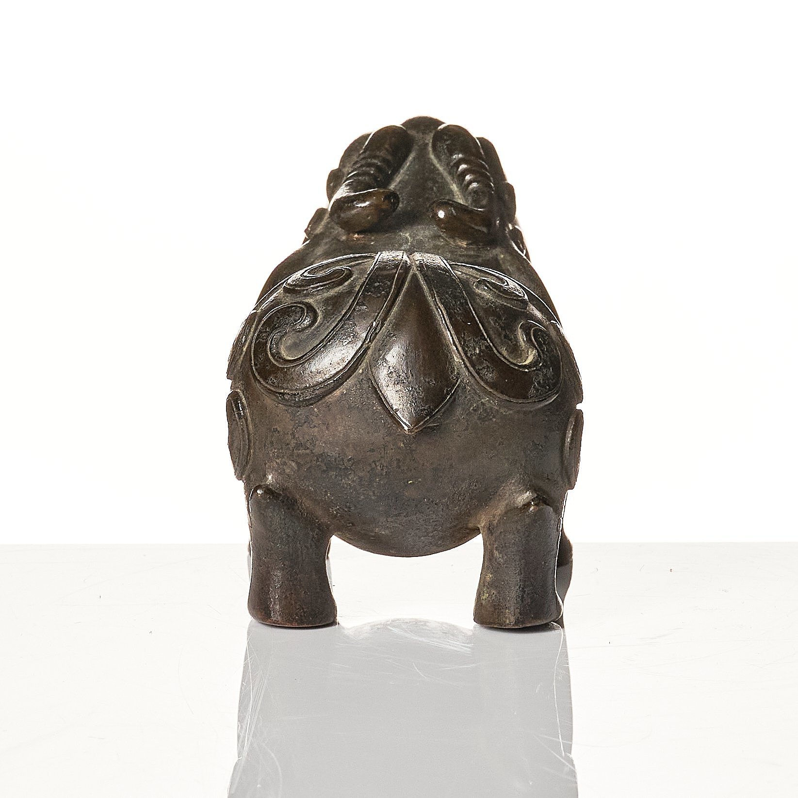 A bronze vessel in the shape of a mythical creature, late Ming dynasty ...