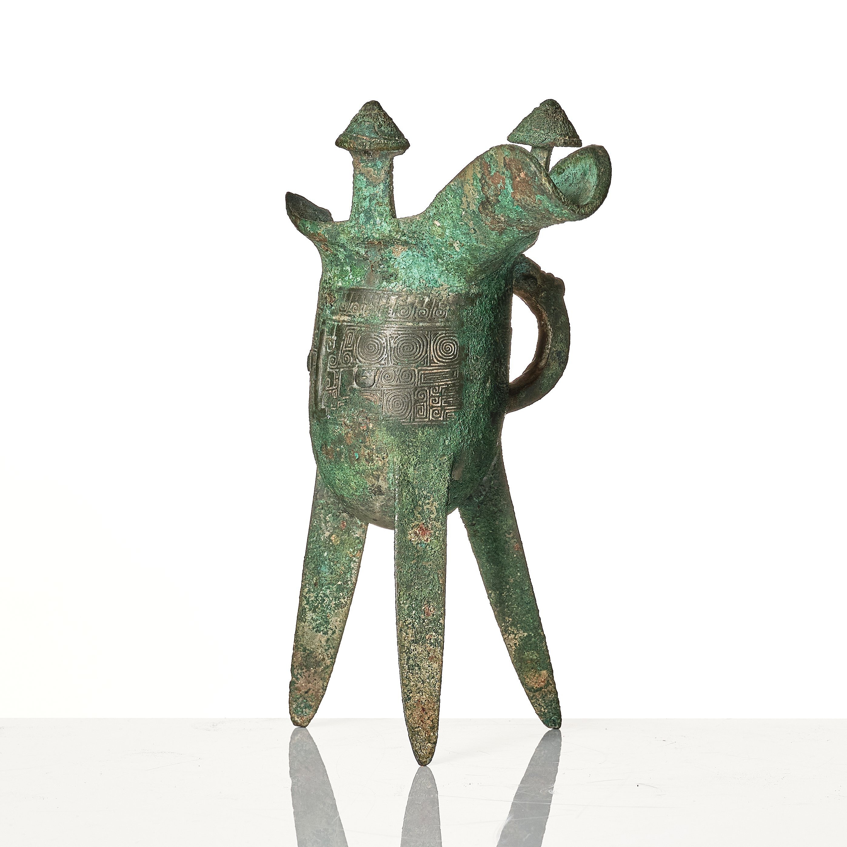 A bronze ritual wine vessel, jue and a bowl, possibly Shang and Ming ...