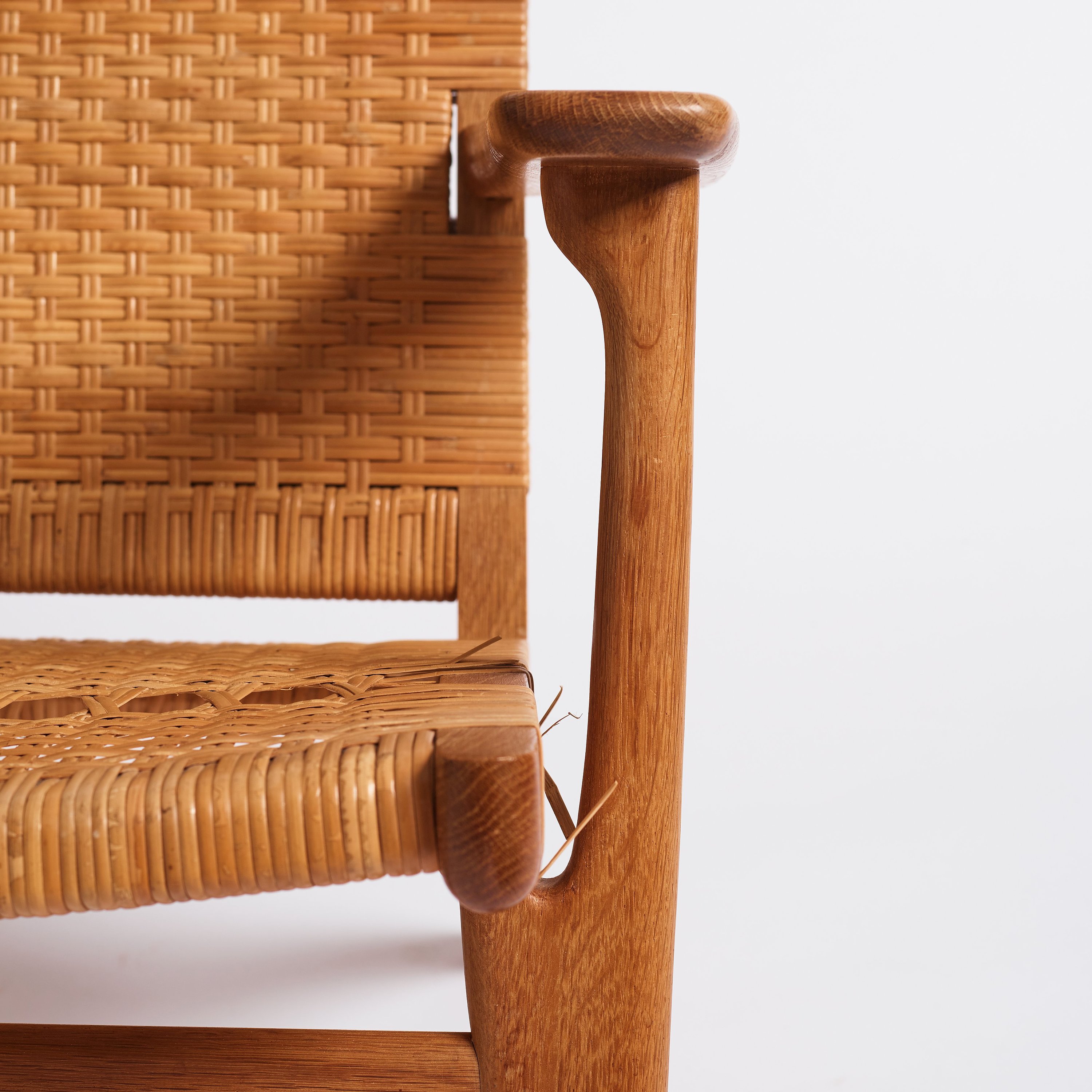 Hans J. Wegner, a pair of oak and rattan 'CH27' chairs, Carl Hansen ...